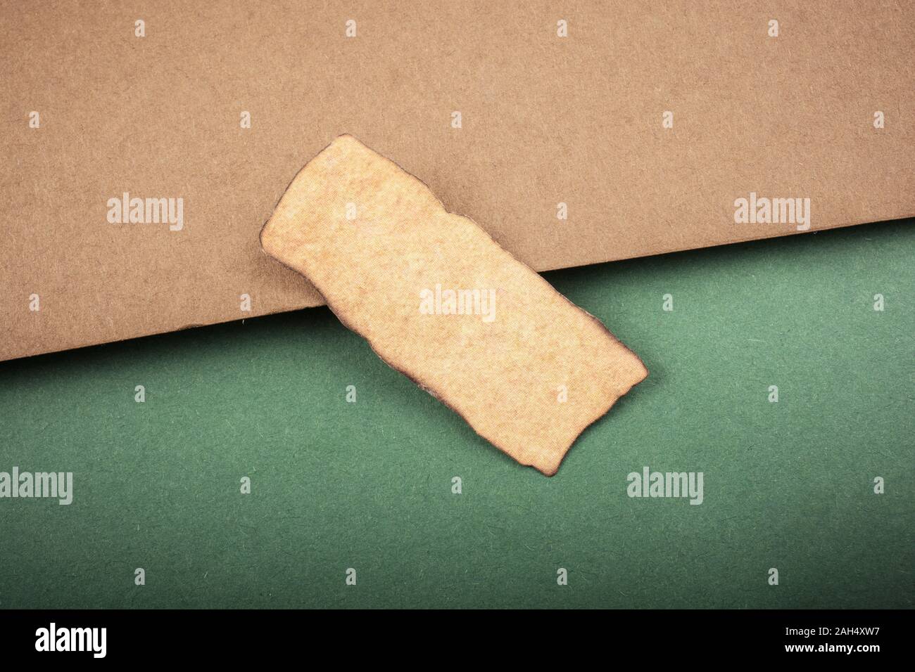 ripped burnt grungy paper with space for text on paper Stock Photo - Alamy