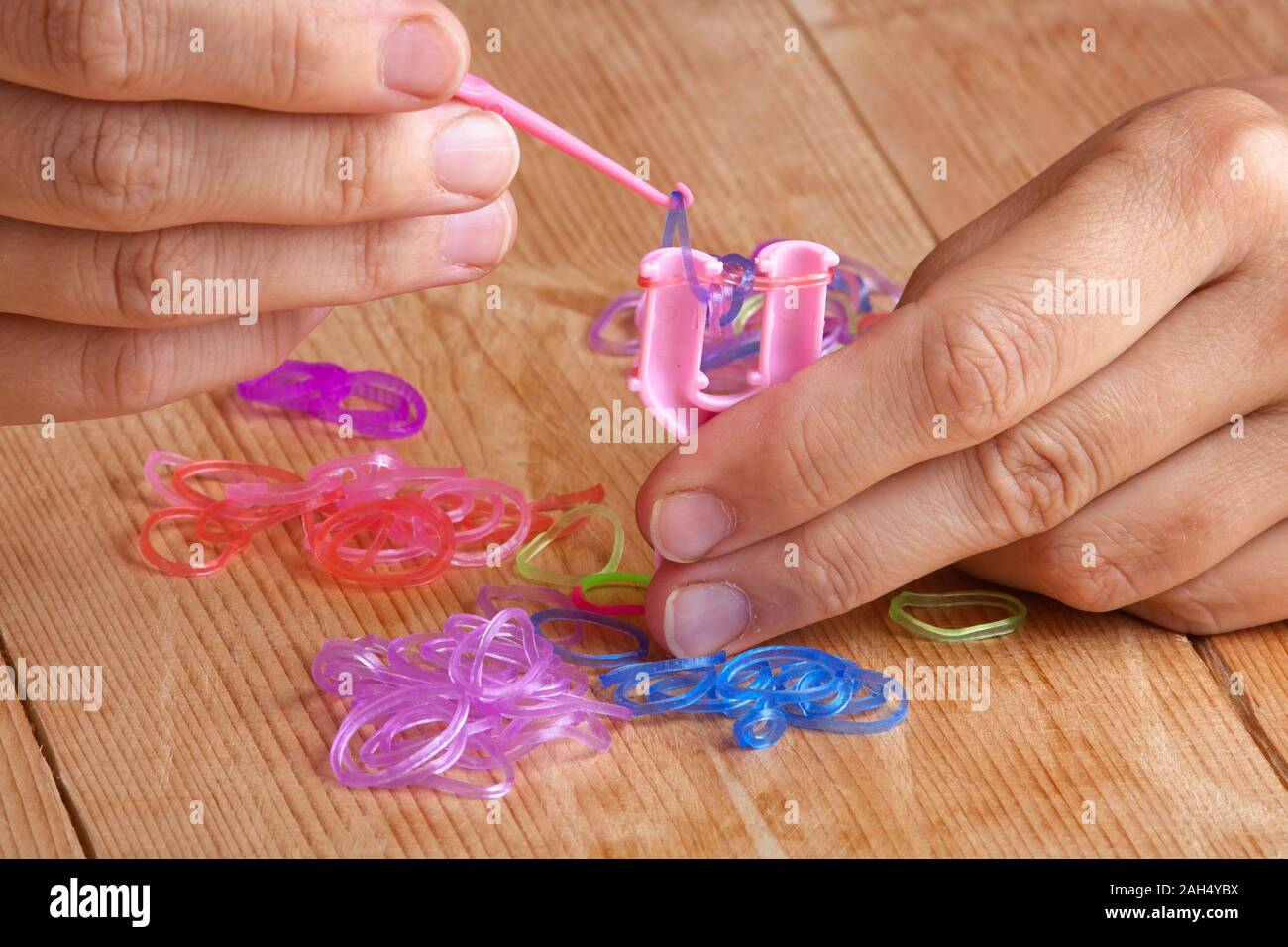 Girl hobby making bracelet hi-res stock photography and images - Alamy