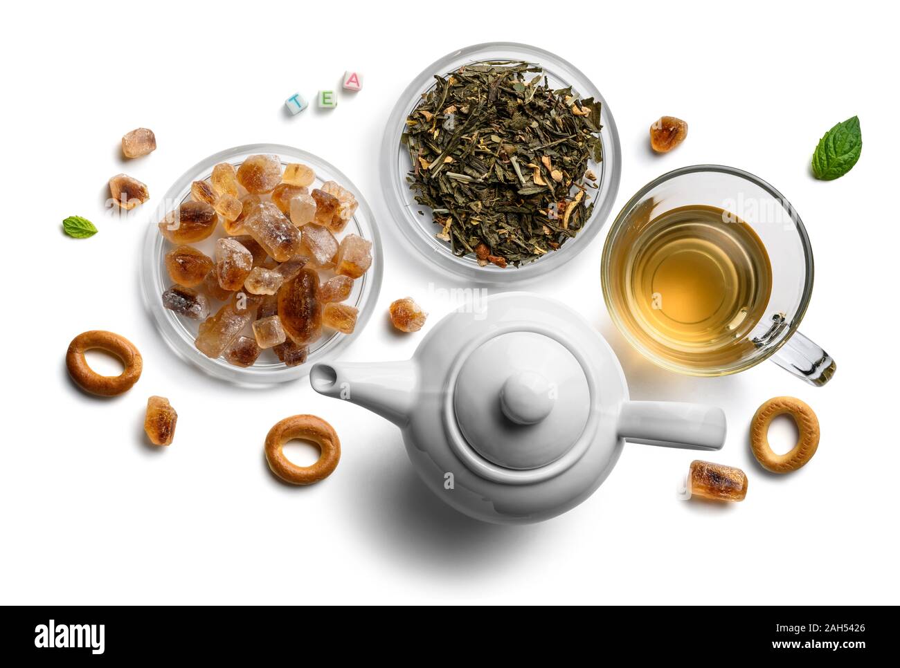 Green tea with natural aromatic additives and accessories. Top view on ...