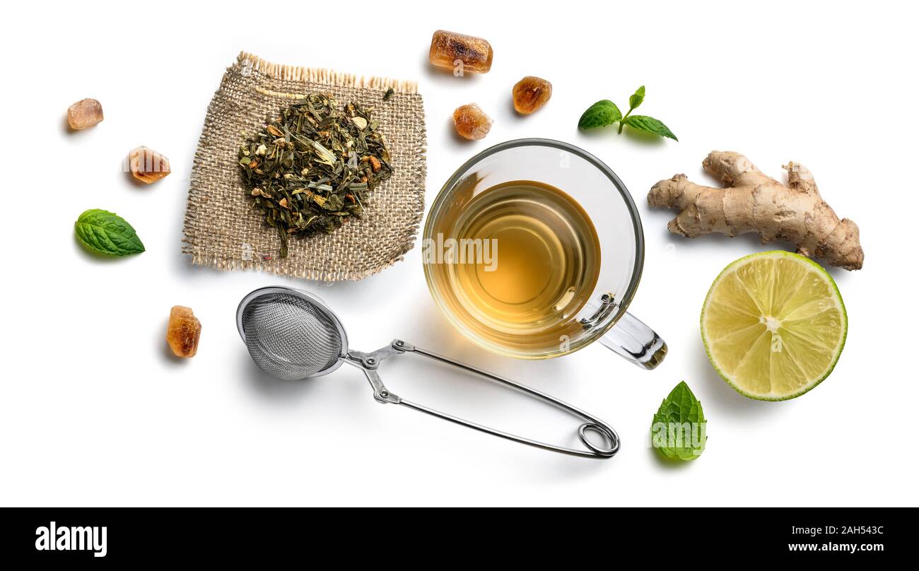 Green tea with natural aromatic additives and accessories. Top view on ...