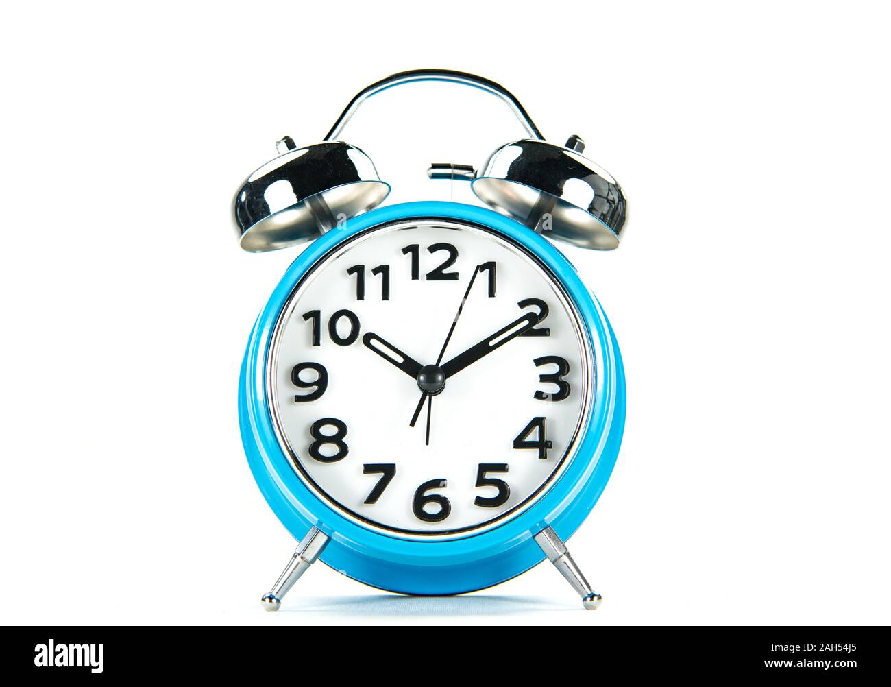 Vintage table clock with bell, light blue color, isolated on white ...