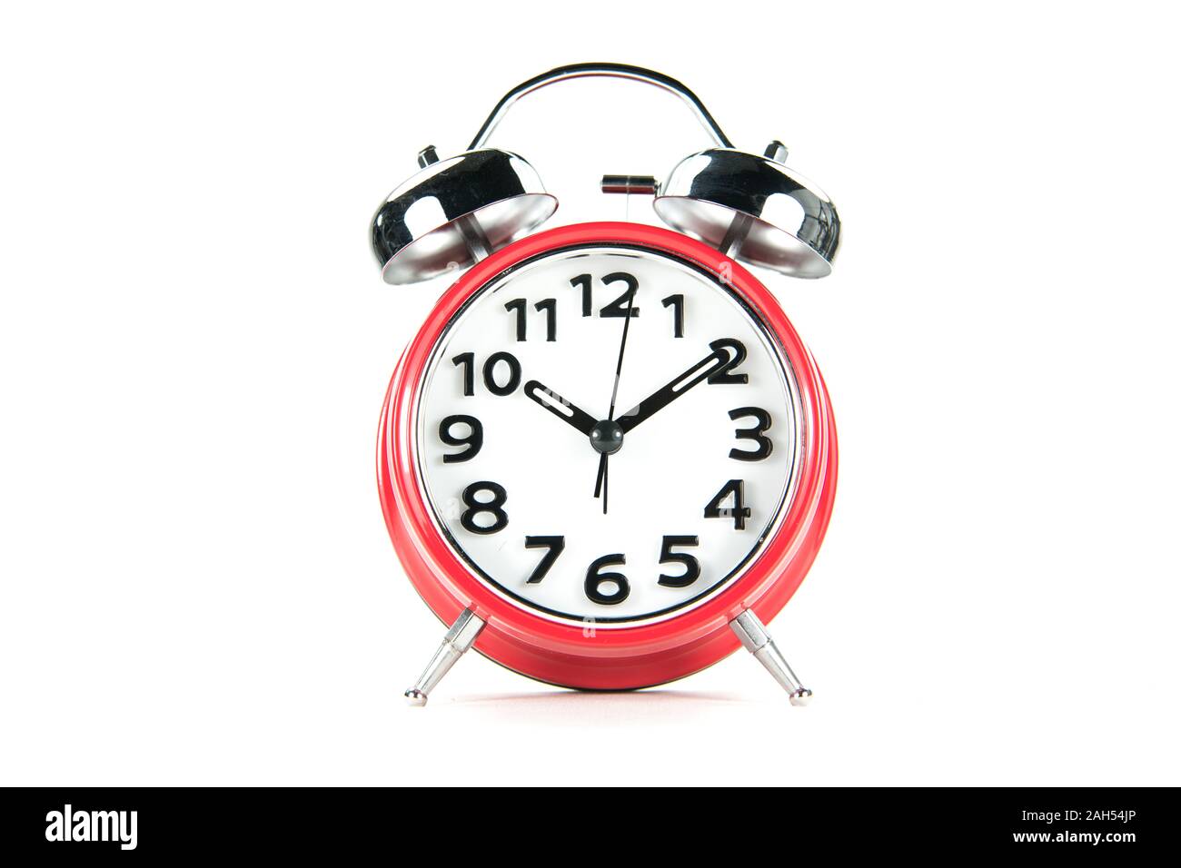Vintage table clock with bell, red color, isolated on white bacground ...