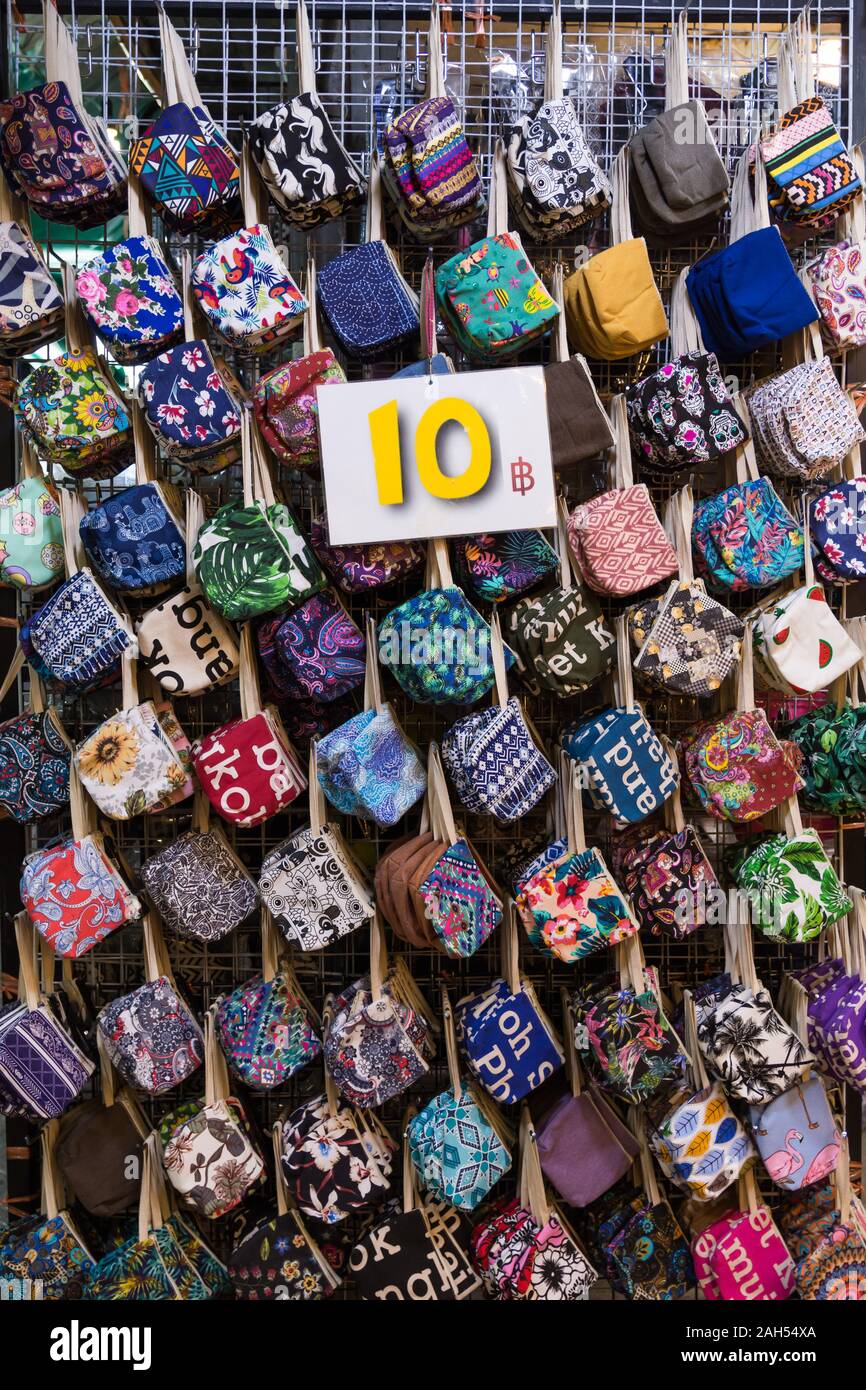 Various types of colorful bags selling at the market in Bangkok ...