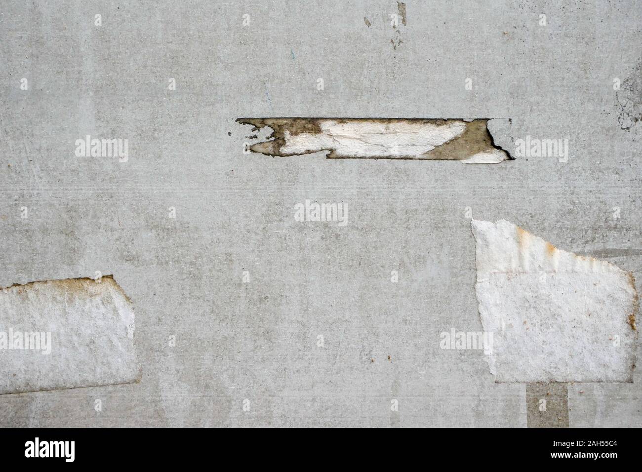 Old grunge posters paper surface texture background Stock Photo - Alamy