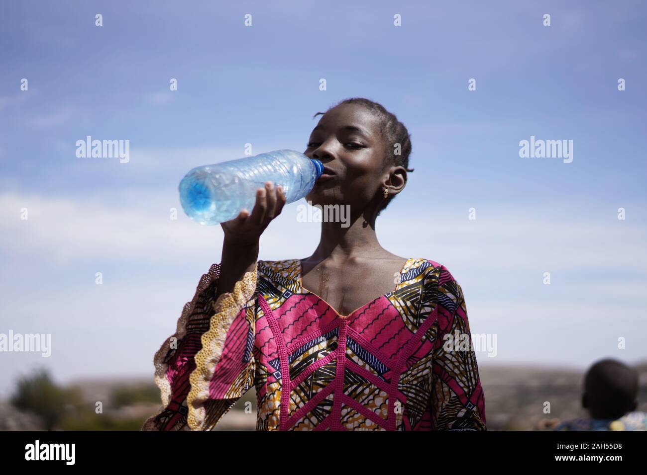 African american child drinking water hi-res stock photography and ...