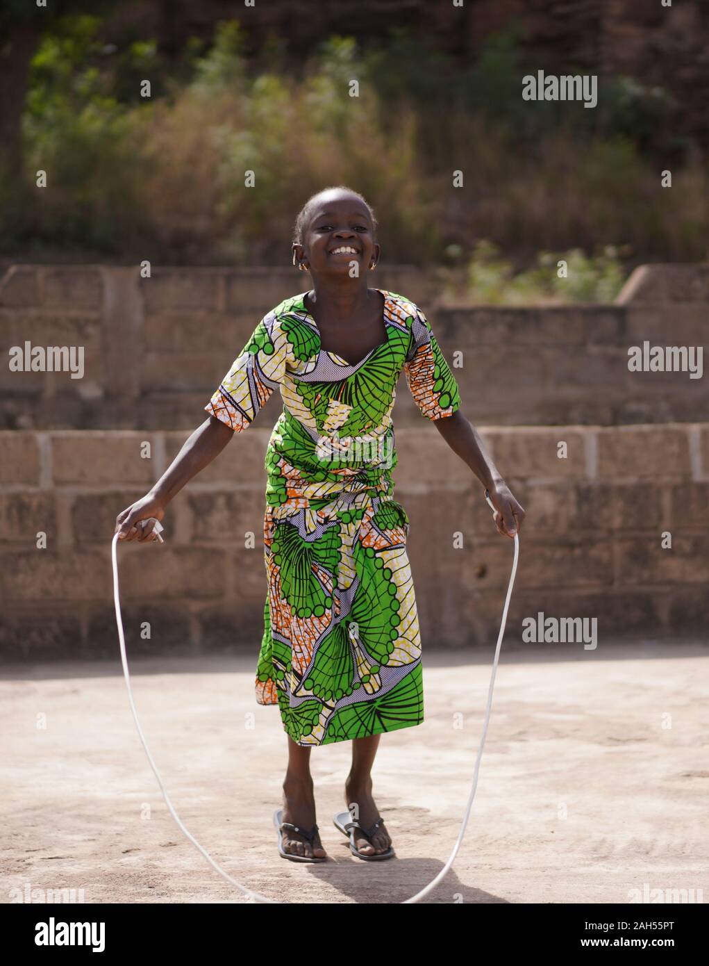Black kids playing jump rope at school hi-res stock photography and ...