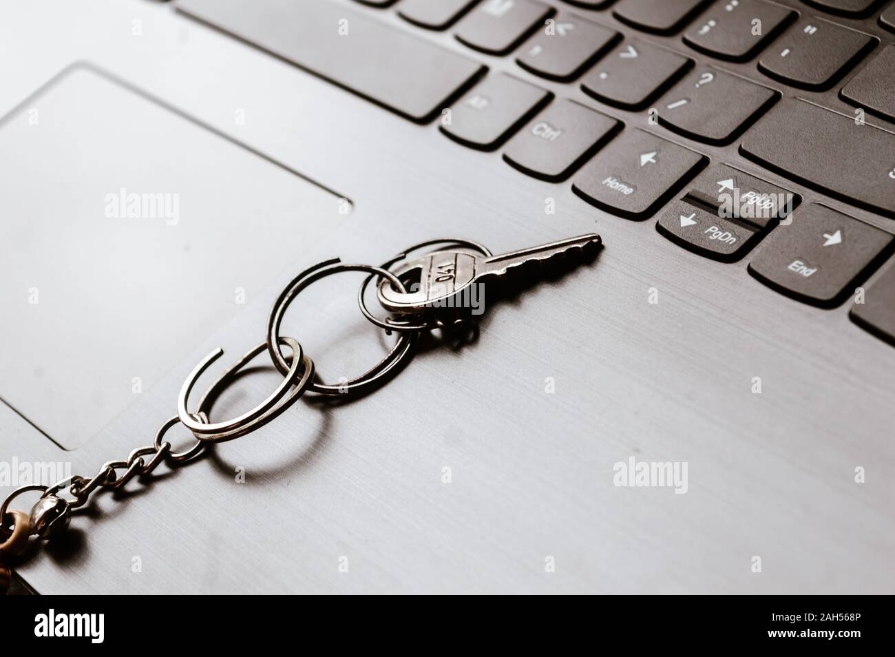 Close up of Still life of Key Ring on laptop computer keyboard ...