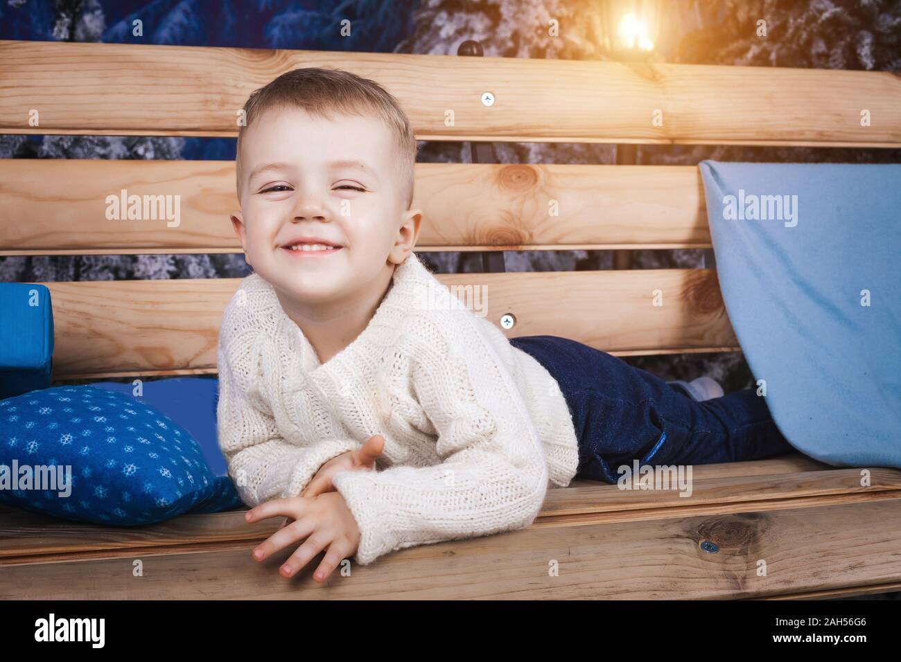 infant lying on the bench Stock Photo - Alamy