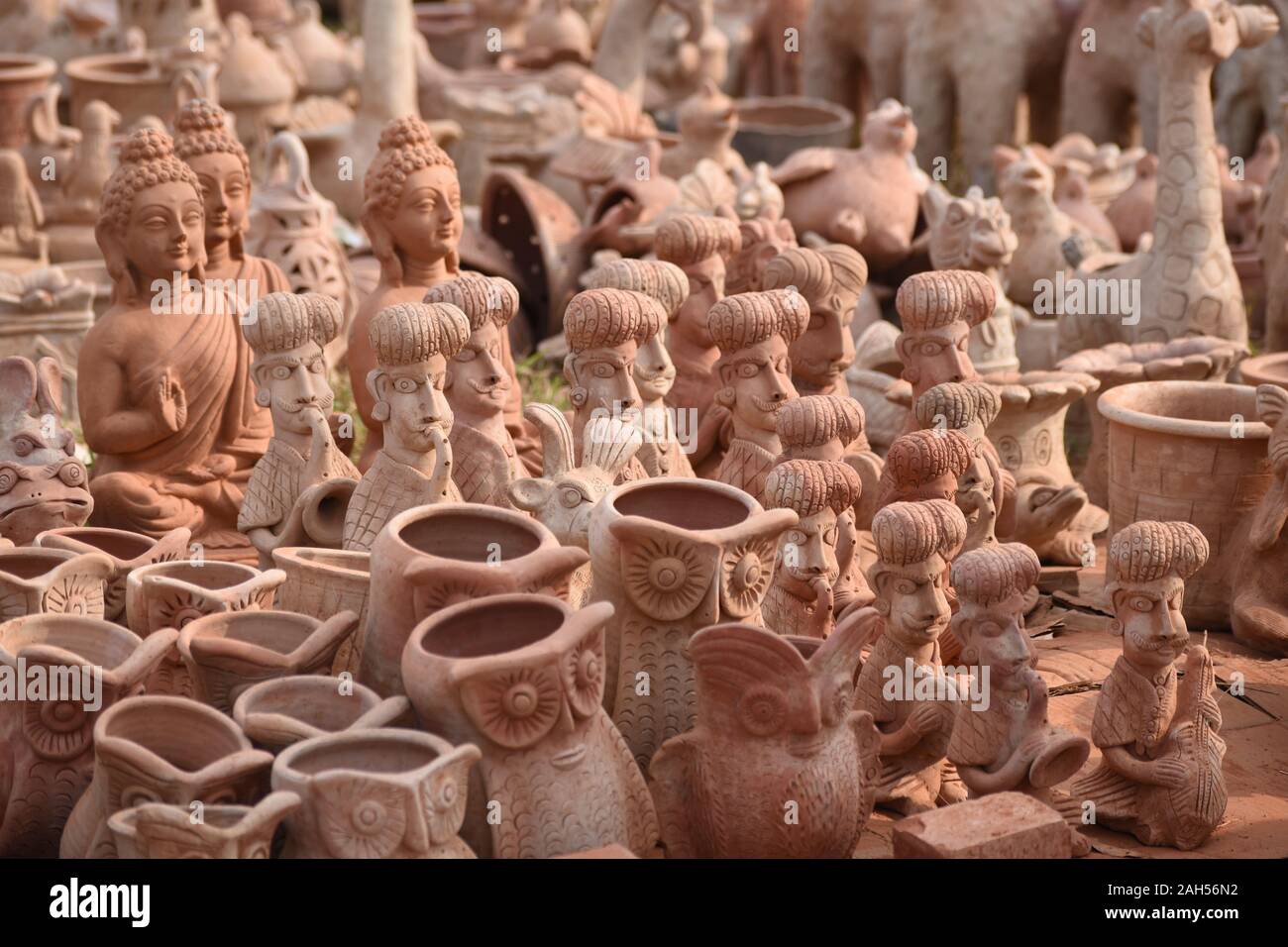 Figurines made of red clay Stock Photo - Alamy