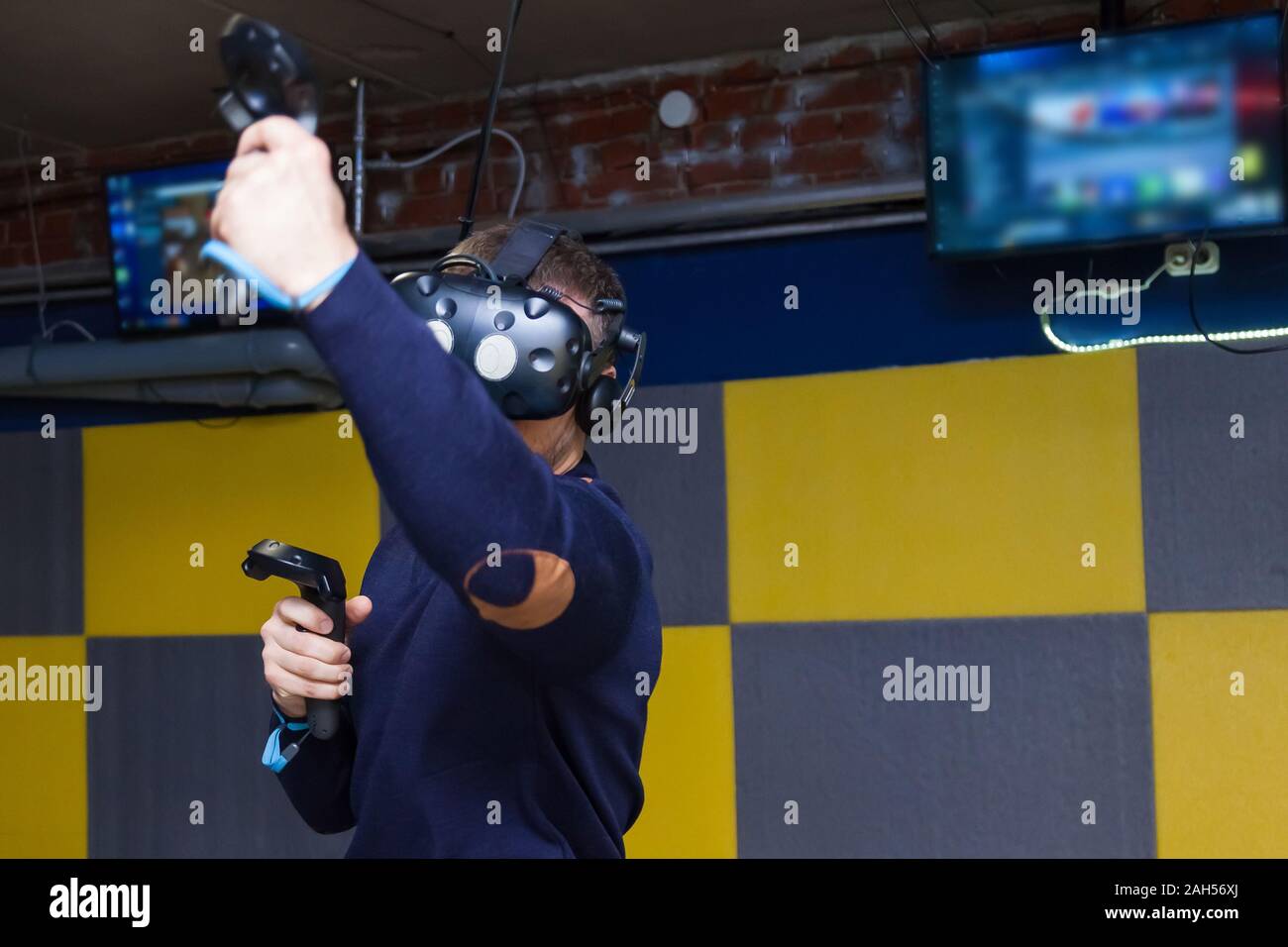 Man in vr helmet controls hi-res stock photography and images - Alamy