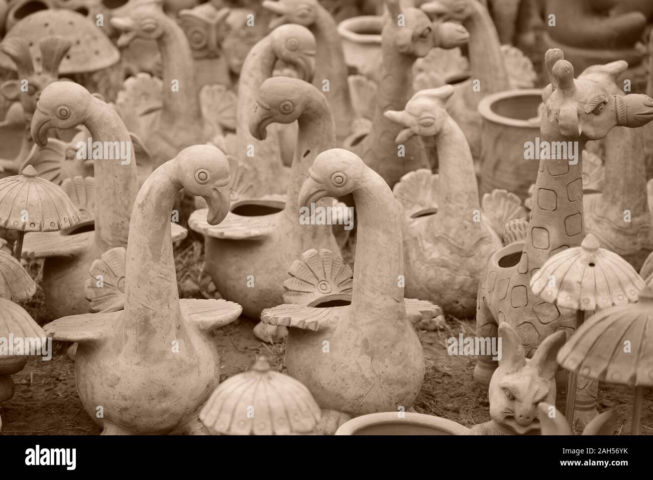 Clay pottery molded in the form of birds and animals Stock Photo - Alamy