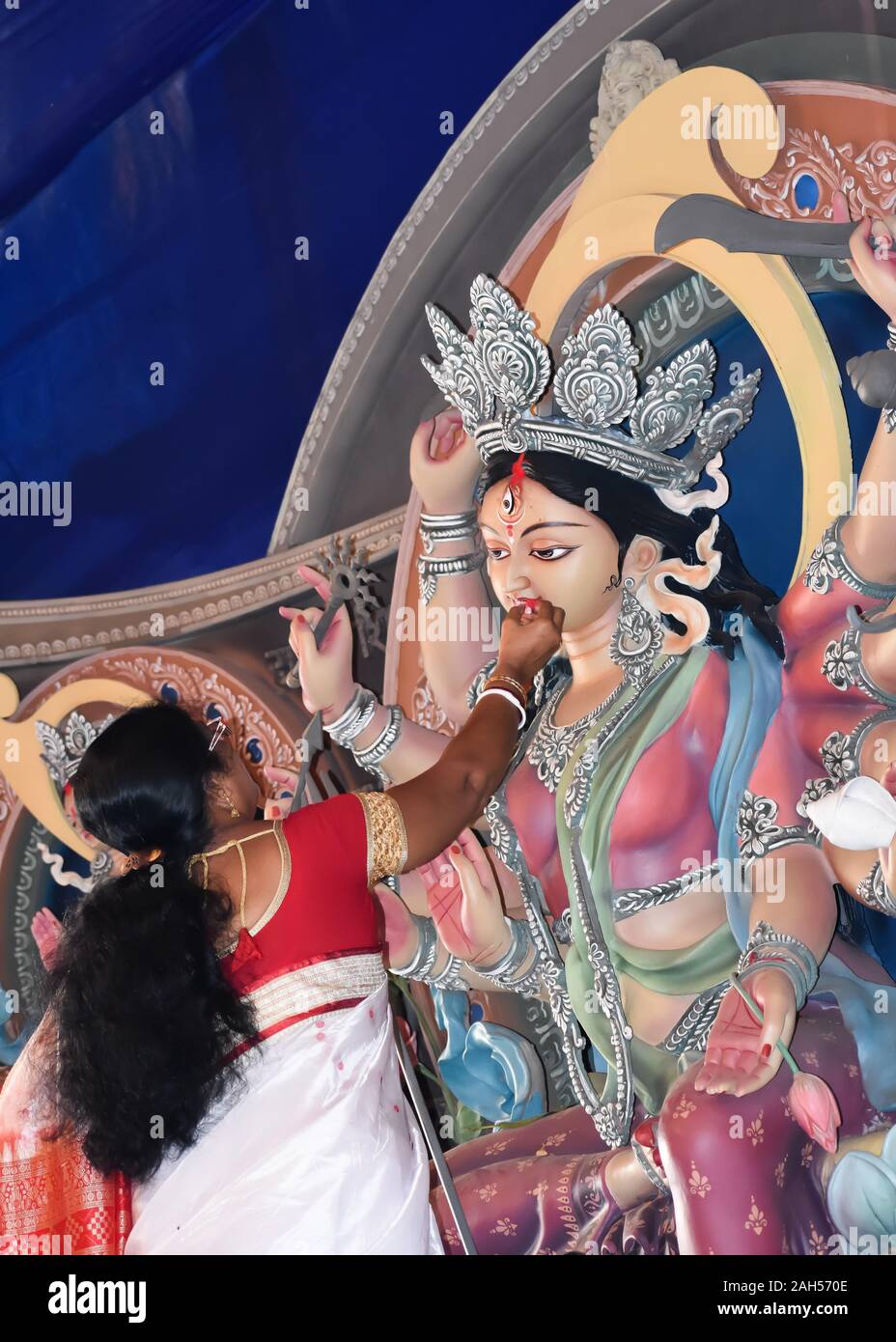 Kolkata October 2019 - Hindu devotee feeding sweets to Maa Durga and ...