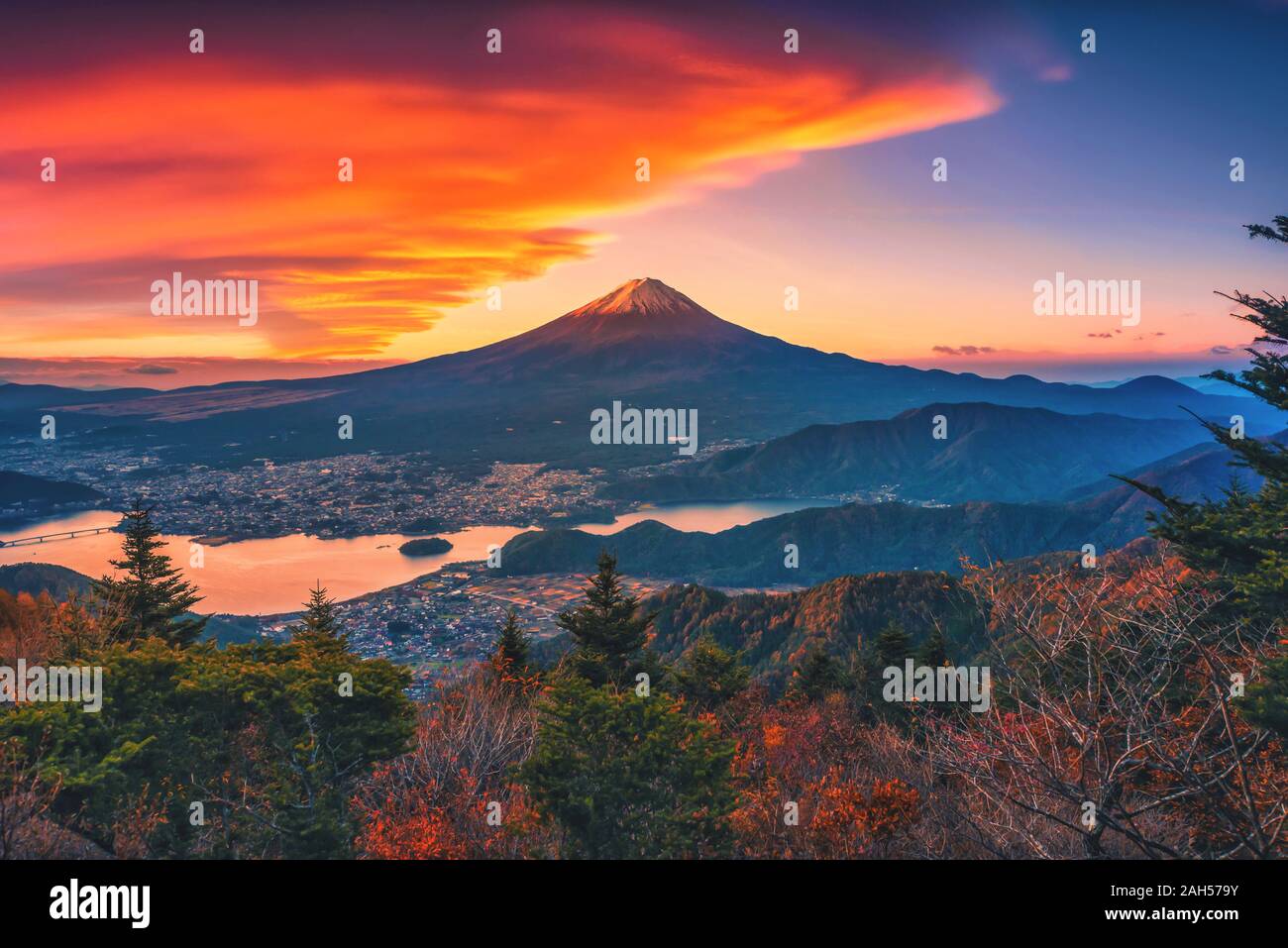 Landscape image of Mt. Fuji over Lake Kawaguchiko with autumn foliage at sunrise in ...