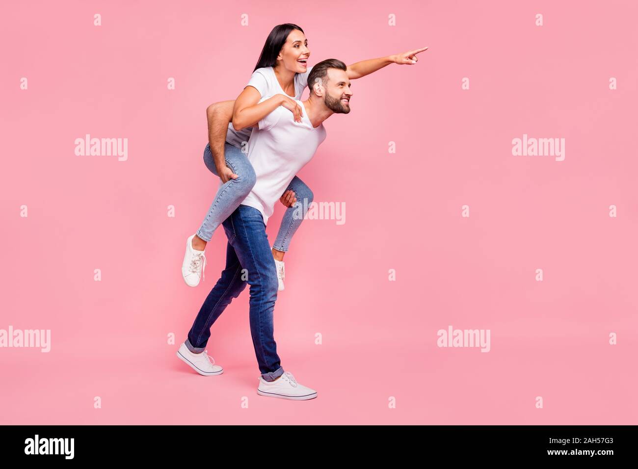 Full length body size photo of rejoicing nice cute couple behaving ...