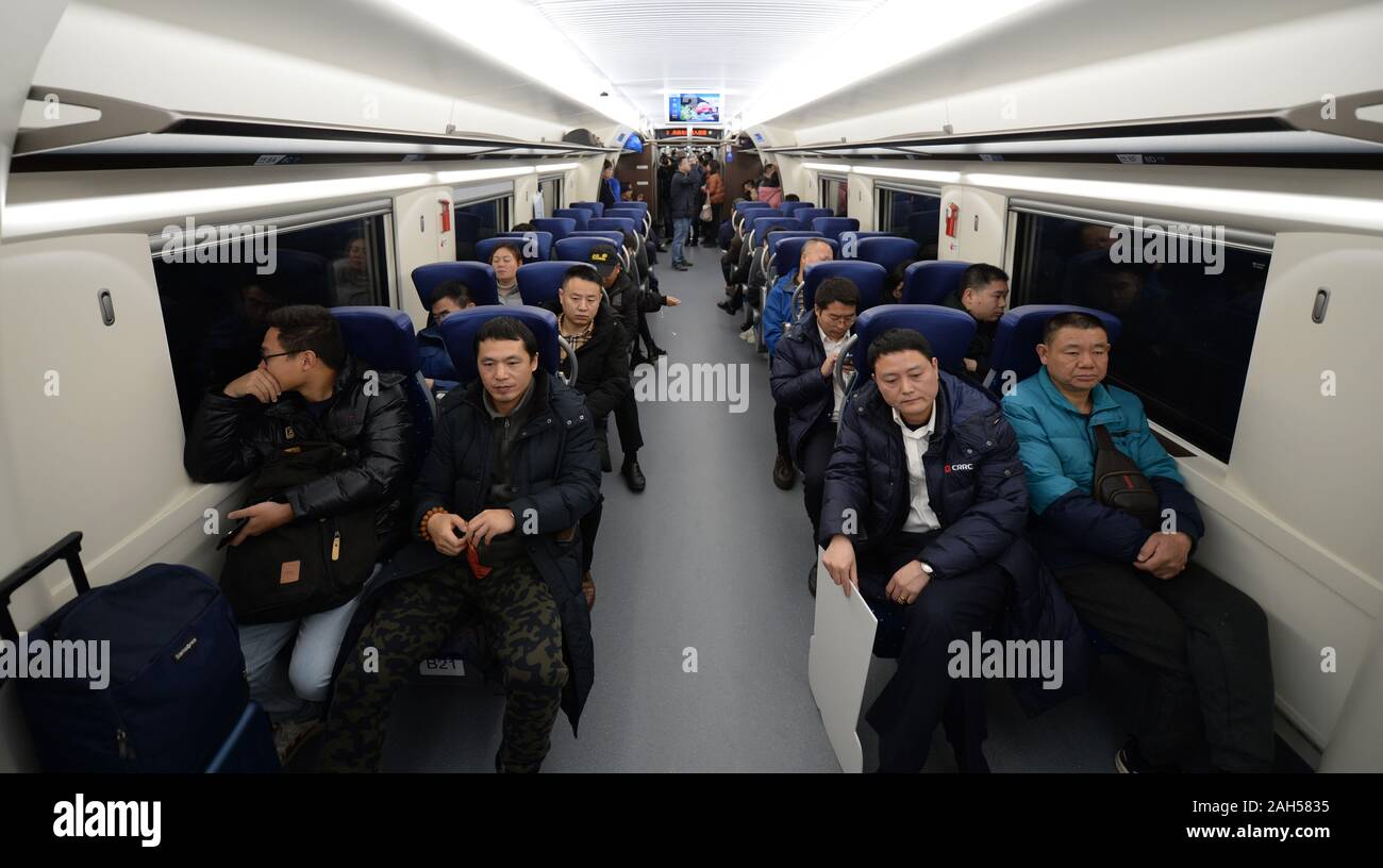 Changsha, China's Hunan Province. 24th Dec, 2019. Passengers take a new ...