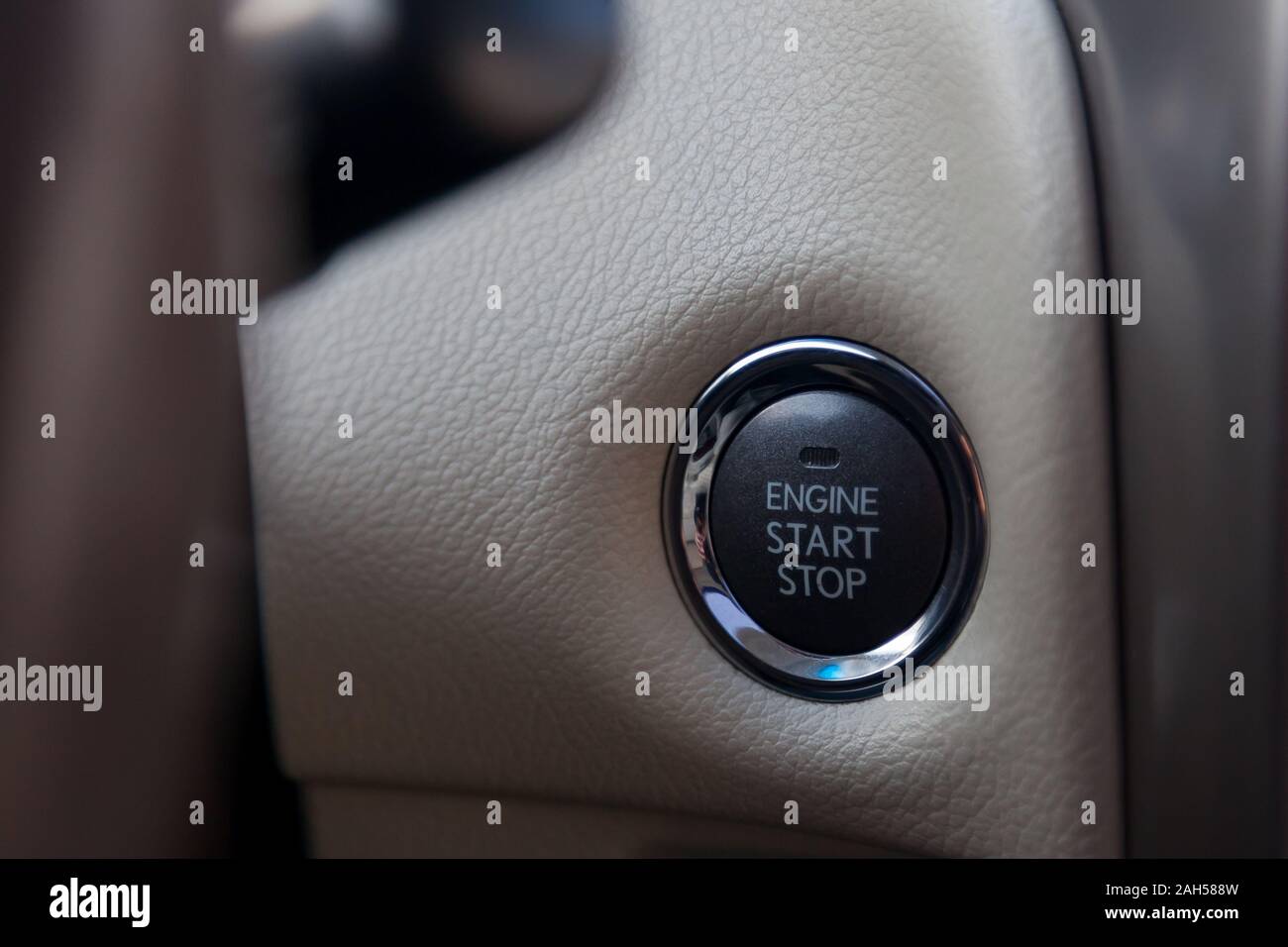 Button start and turn off the ignition of the car engine close-up on ...