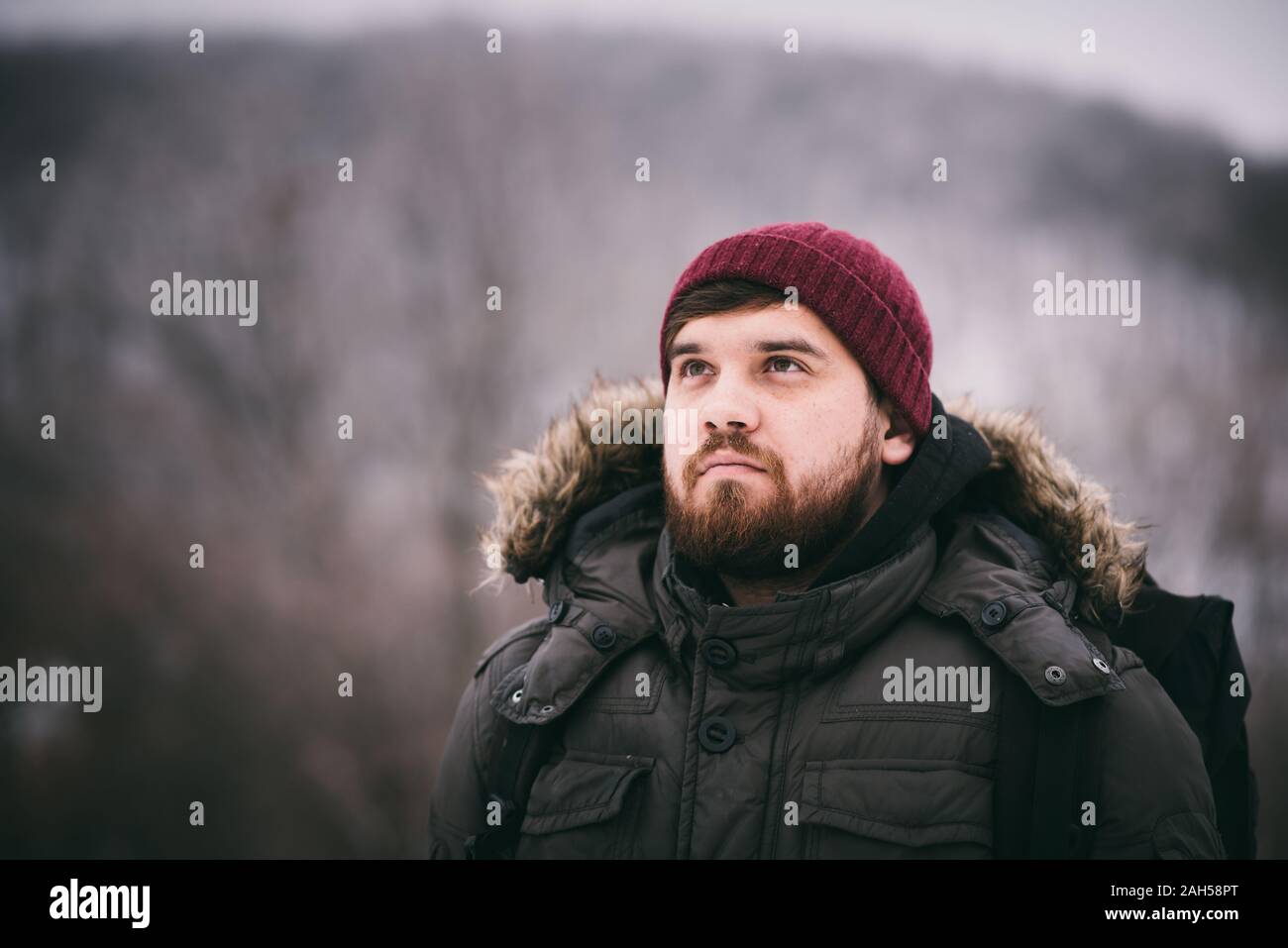 winter portrait of a traveler in the woods Stock Photo - Alamy