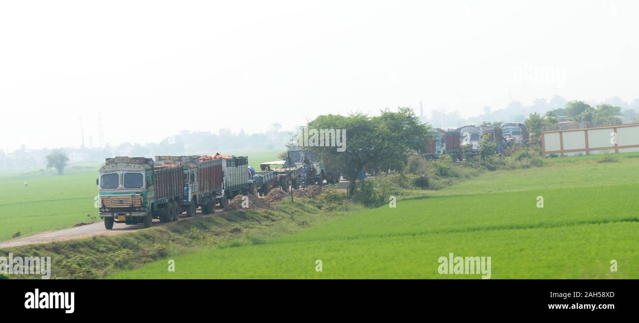 Long queue traffic of heavy cargo lorry trucks Vehicles waiting in line ...