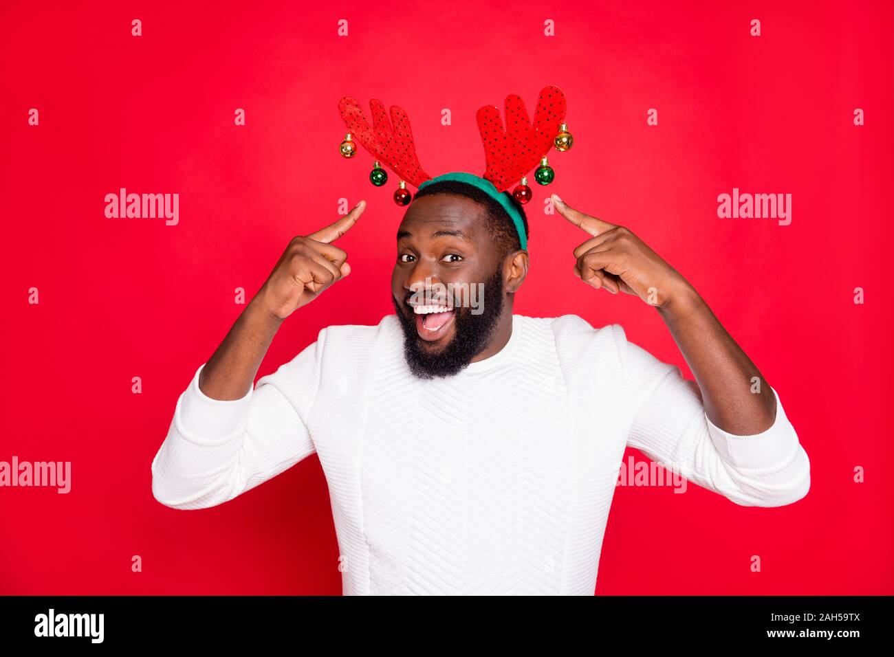 Portrait of amazed surprised brown hair crazy black skin man point at ...