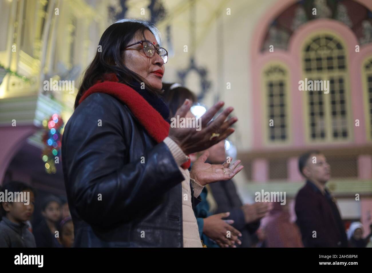 Kathmandu, Nepal. 24th Dec, 2019. A Nepalese Christian worship God ...