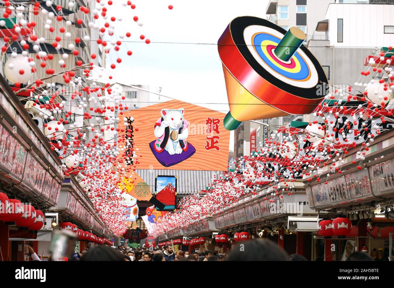 Tokyo, Japan. 25th Dec, 2019. A large wooden board with a picture of ...
