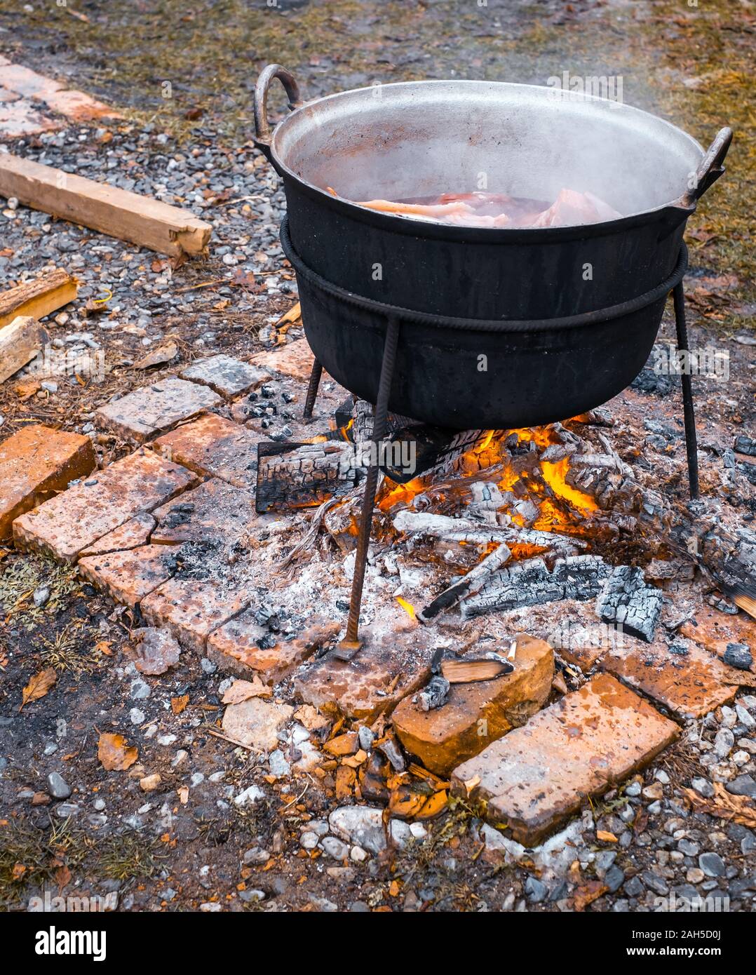 Romanian traditional food prepared at the cauldron on the open fire ...