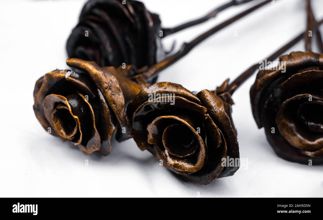 iron rose with petals on white background Stock Photo - Alamy