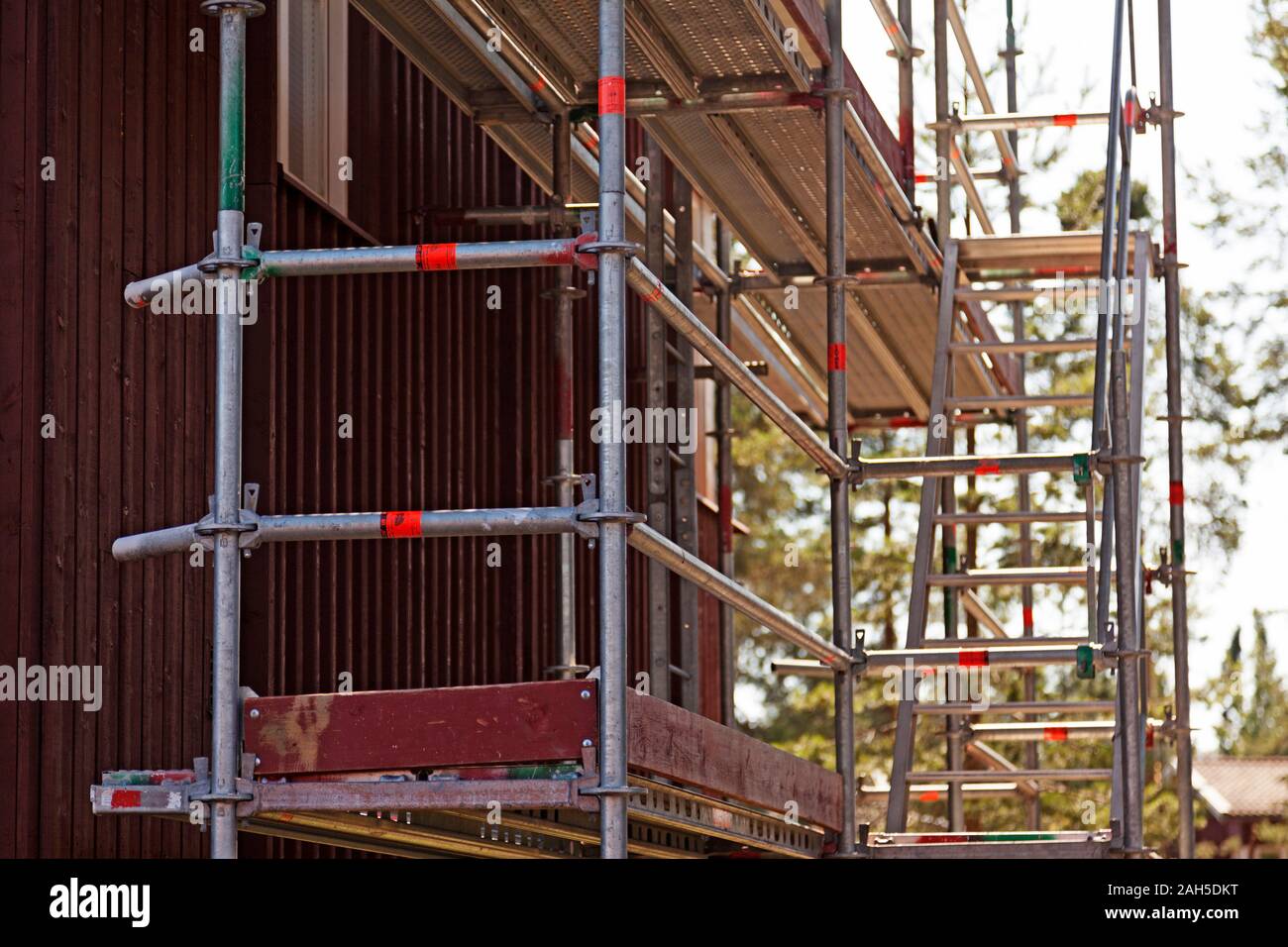 scaffolding mounted to repaint facade of houses in Roback Stock Photo ...