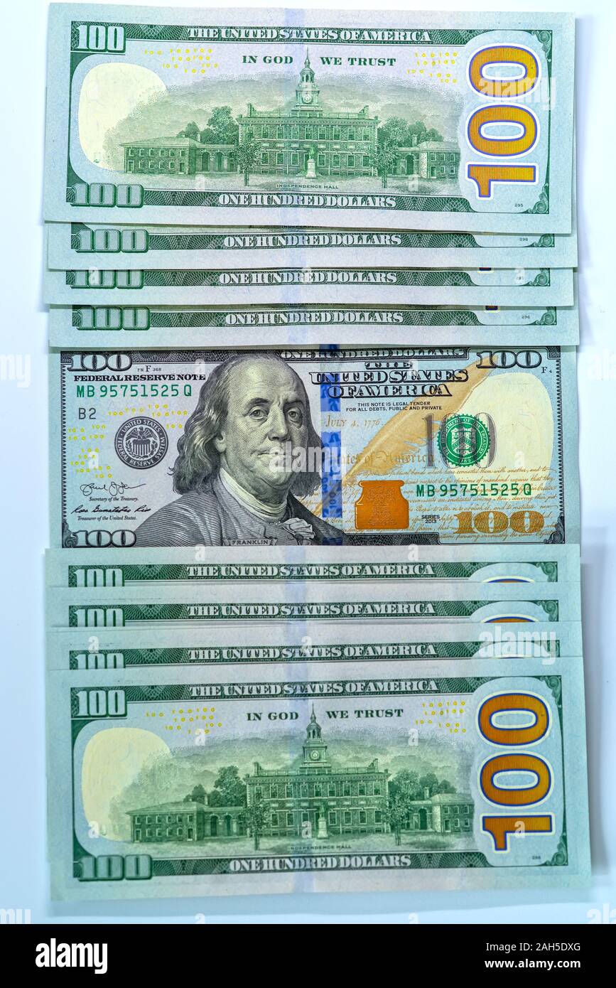 USD 100 dollars banknotes on a group of money isolated on white ...