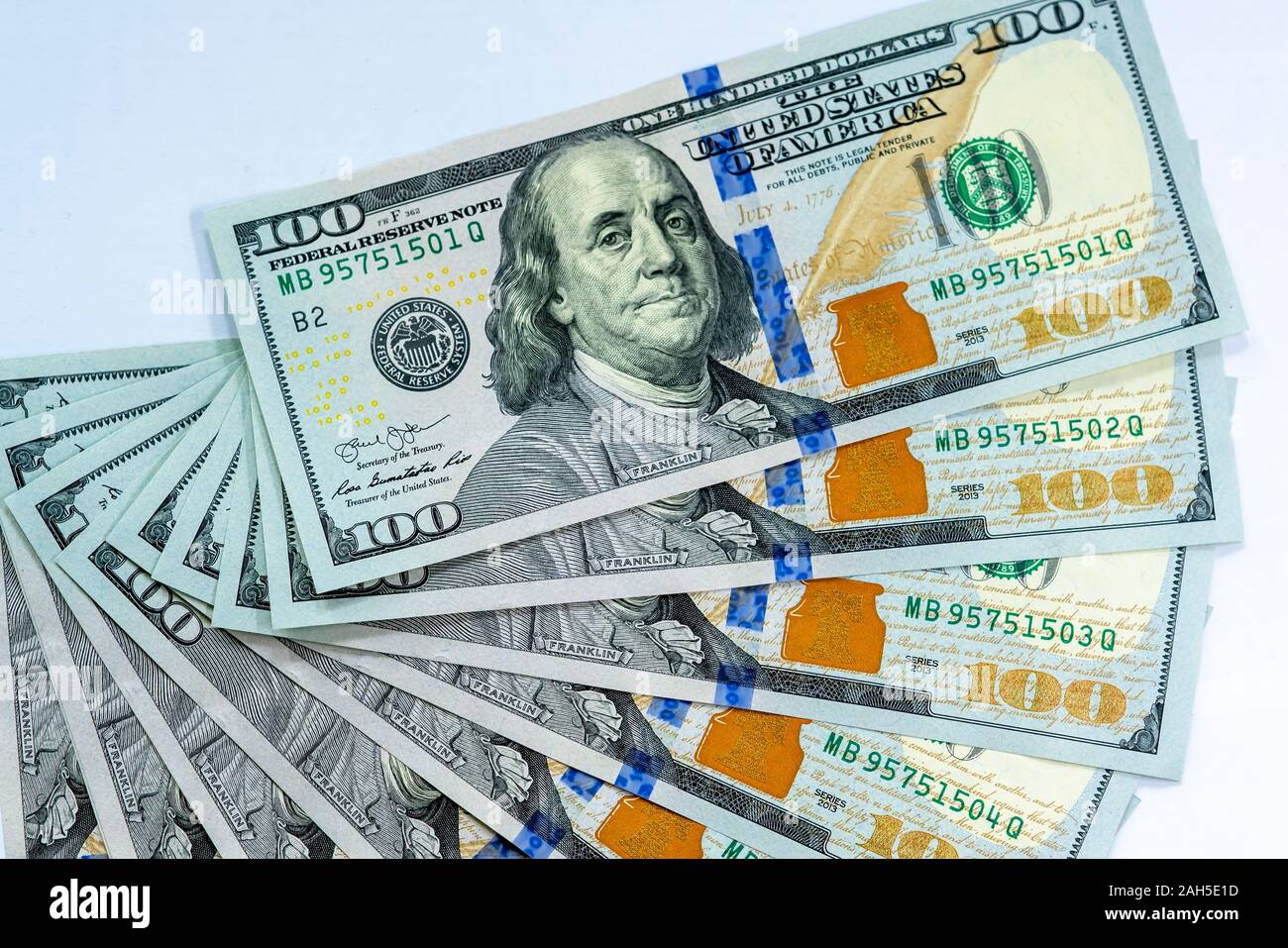 USD 100 dollars banknotes on a group of money isolated on white ...