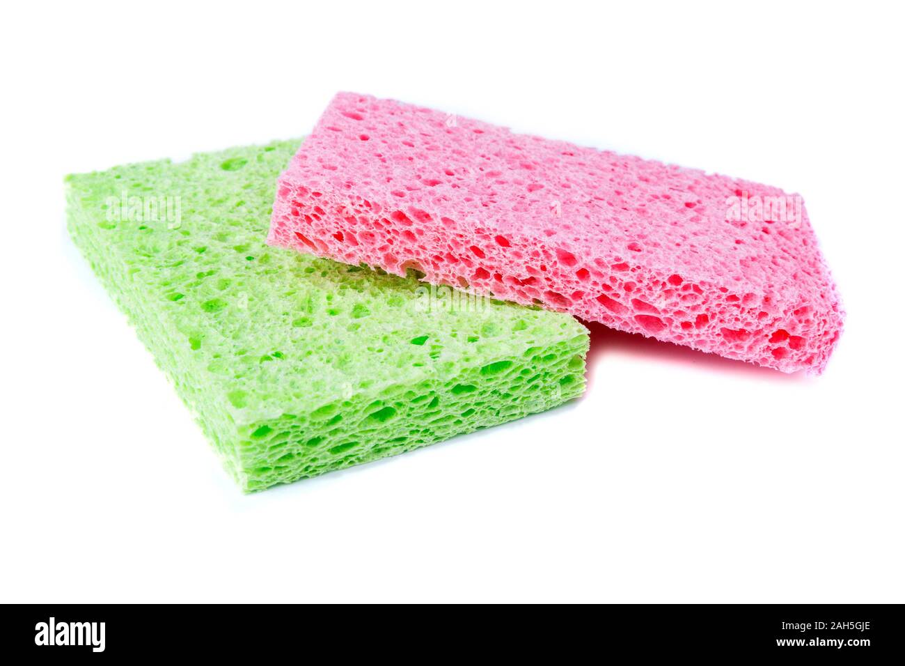 Rectangular green and pink cellulose washing sponges with coarse and ...