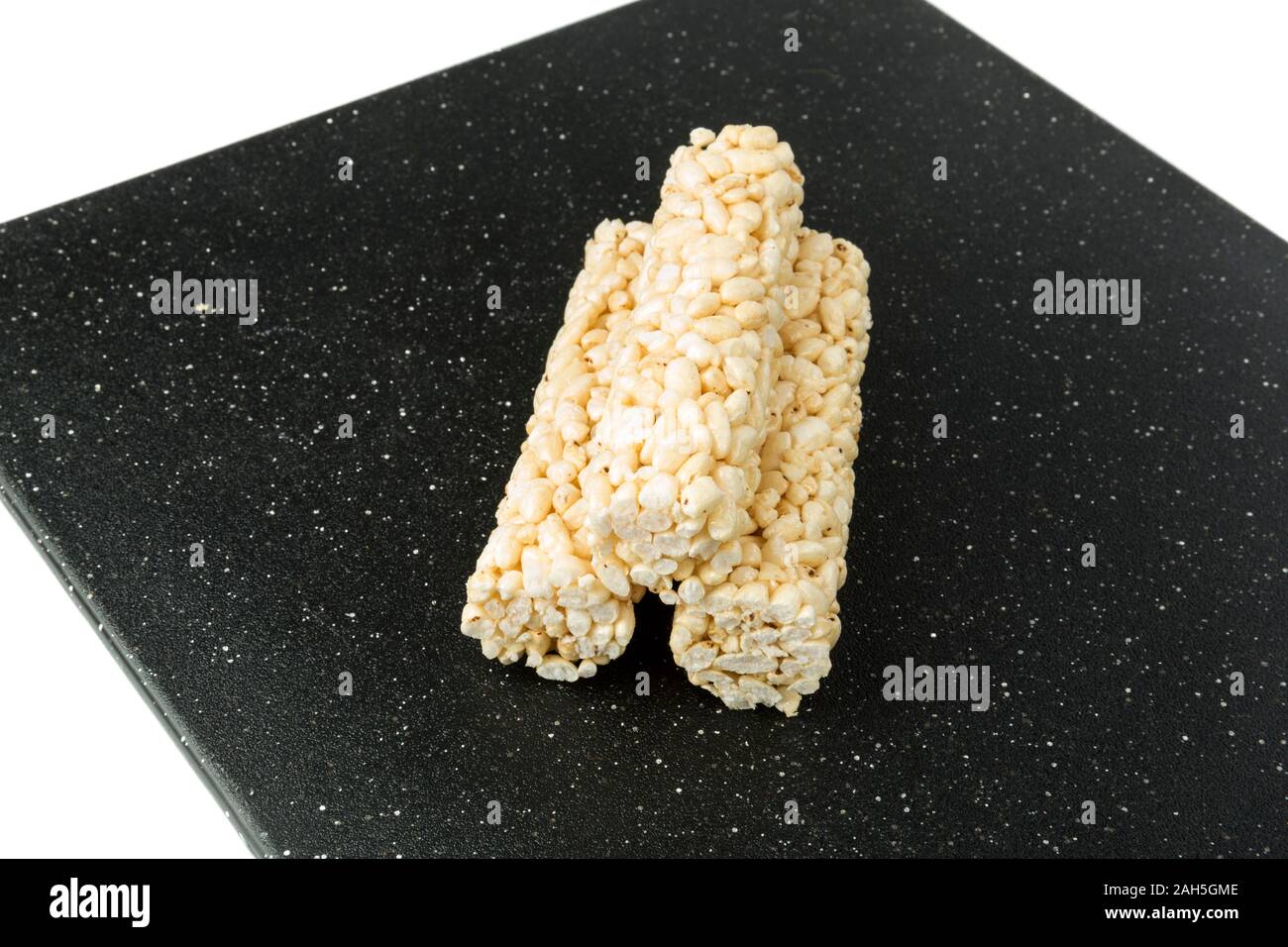 Several puffed plain round rolled rice snacks Stock Photo - Alamy
