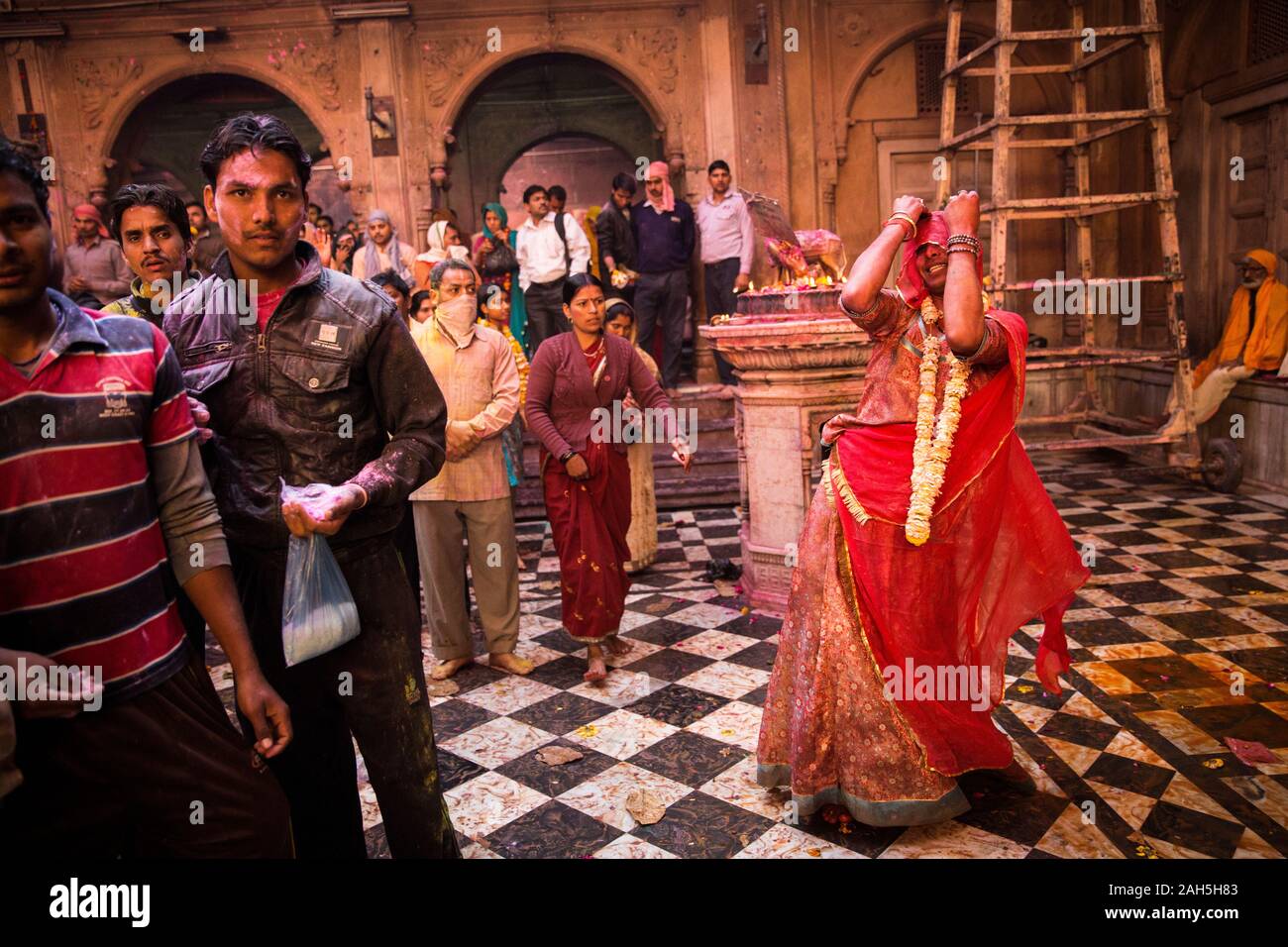 Hijra dancing inside Bankey Bihari temple during Holi celebrations ...
