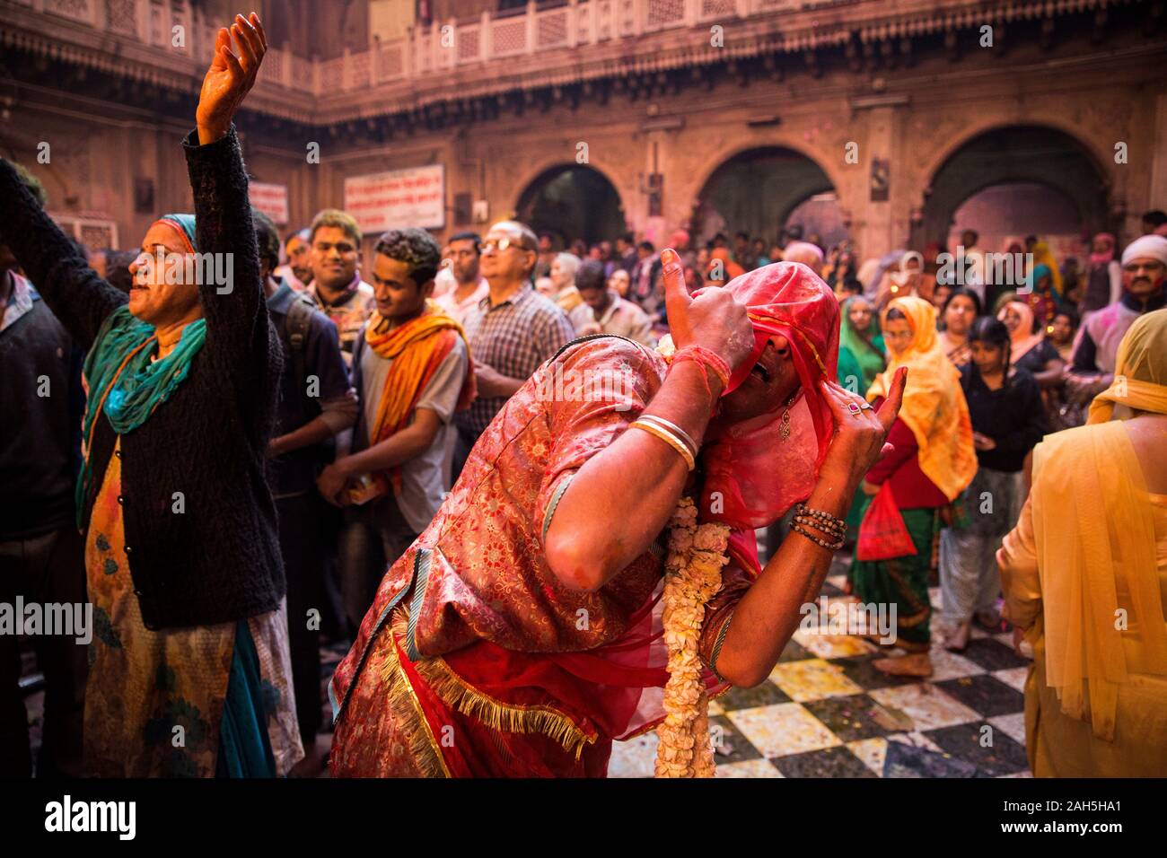 Hijra dancing inside Bankey Bihari temple during Holi celebrations ...