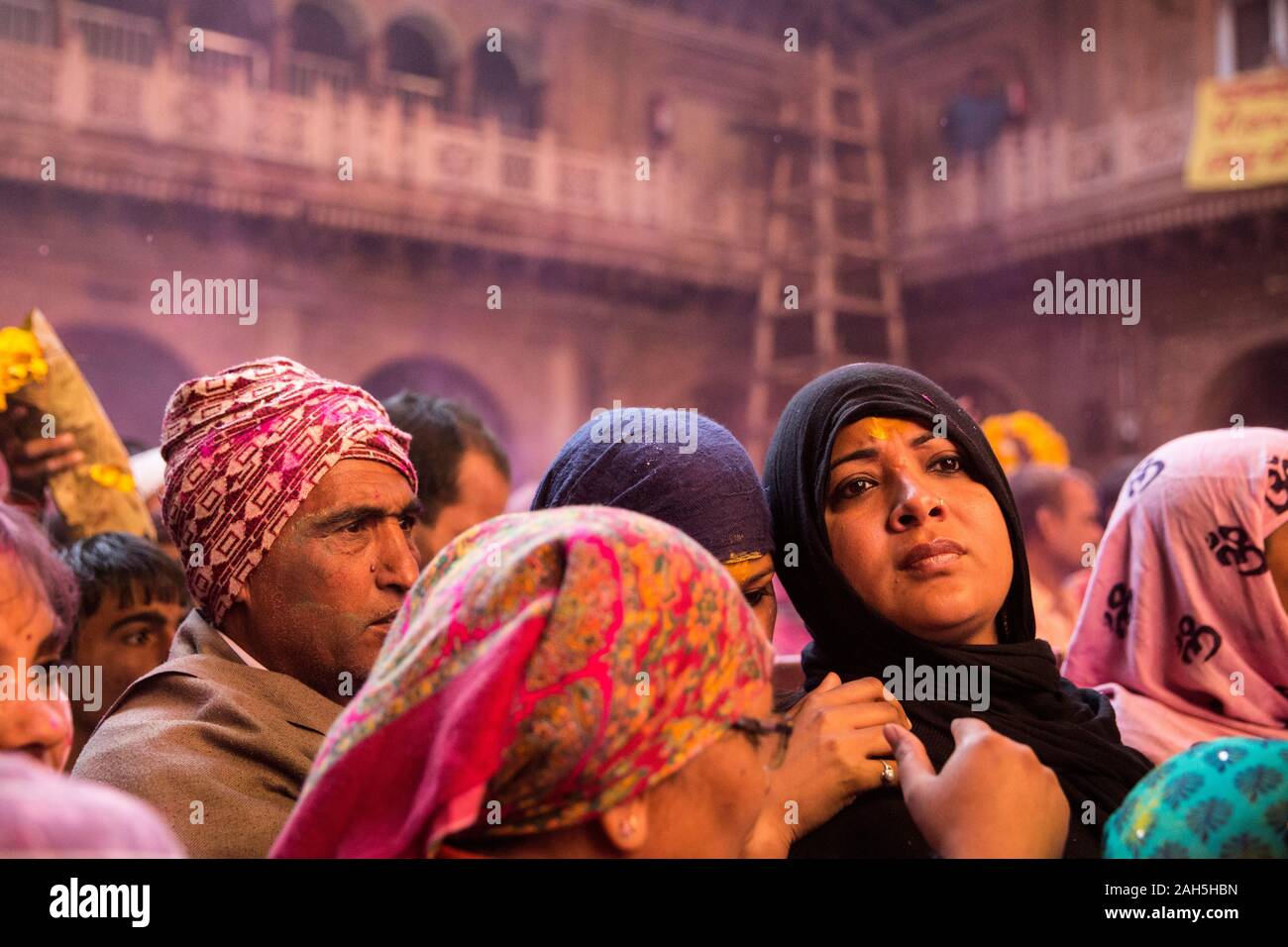 People attending Holi celebrations inside Bankey Bihari temple ...