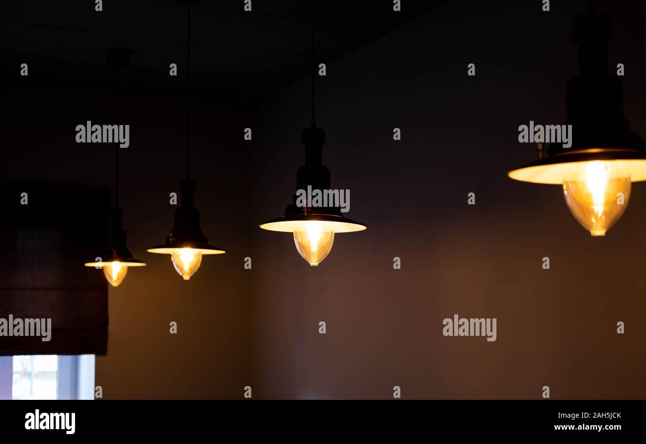 Lighting for a nice cozy cafe. Dim light in the room. Romantic light ...