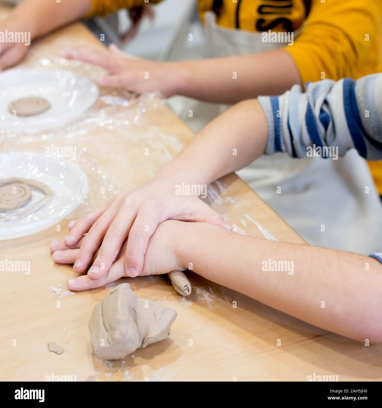 Children hands that mold from clay. Children creativity. Crafts from ...