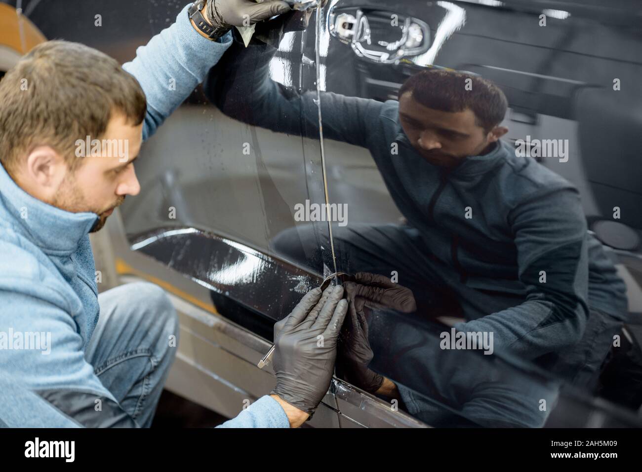 Film cutter hi-res stock photography and images - Alamy