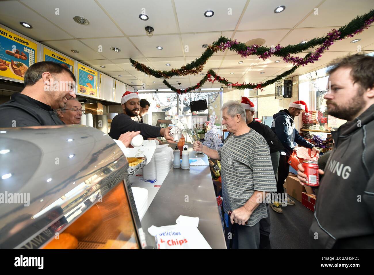 Staff serve free portions fish hi-res stock photography and images - Alamy