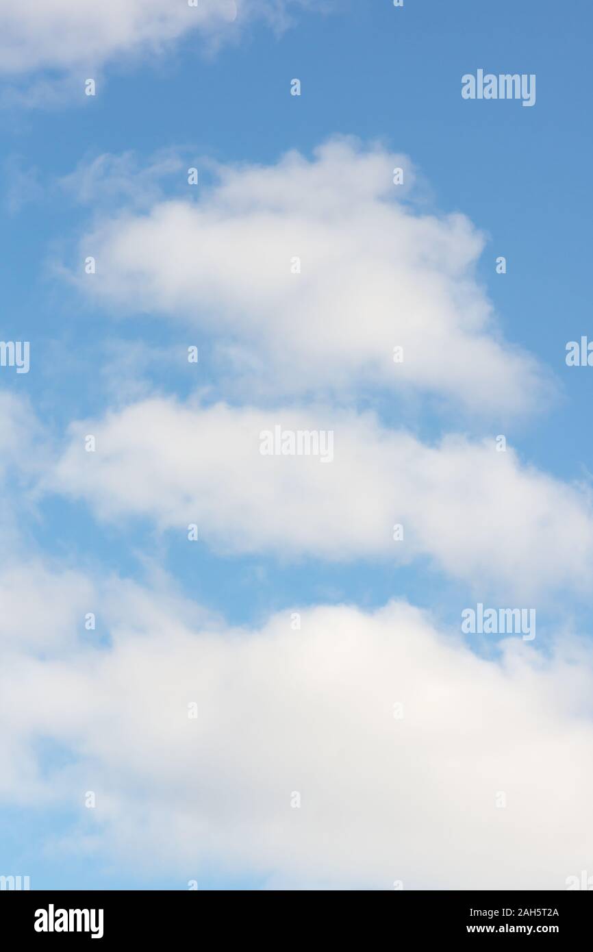 blue sky with flying white light clouds Stock Photo - Alamy