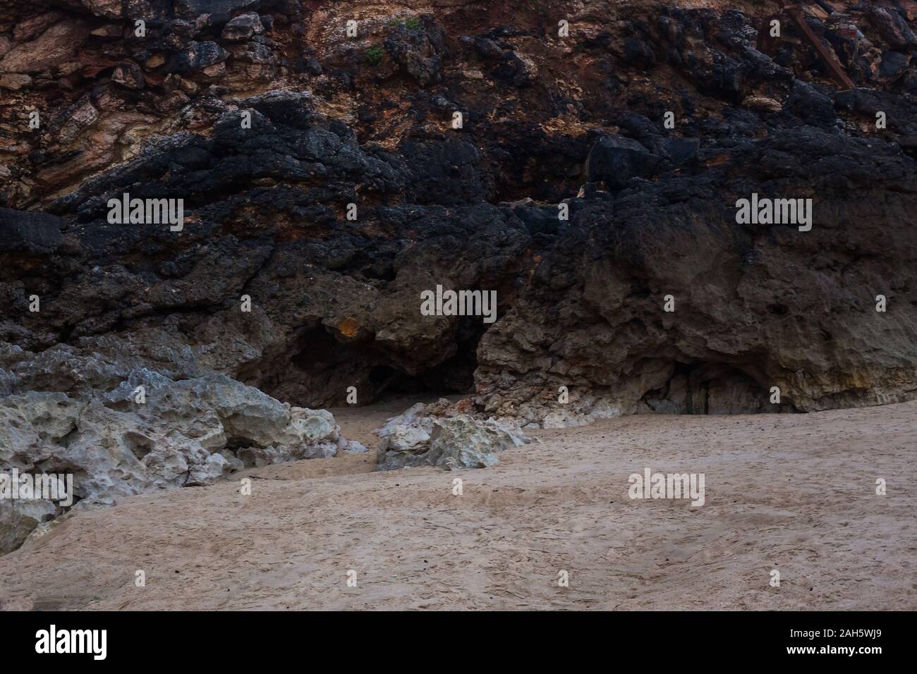 Beach of Nazare, Portugal. Cliff and sand Stock Photo - Alamy
