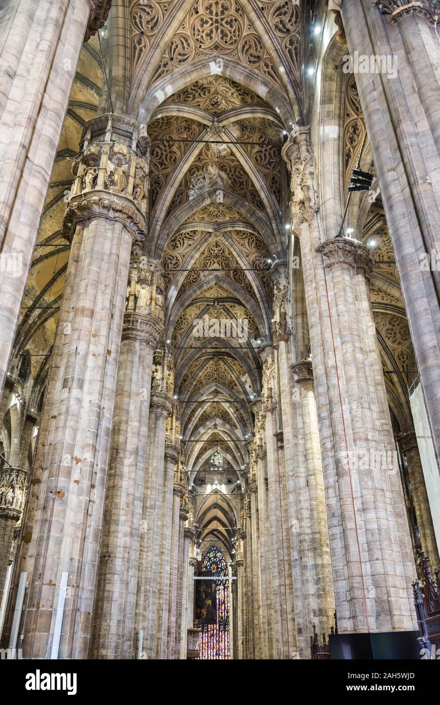 Interiors of building with columns of the Milan Cathedral (Duomo di ...