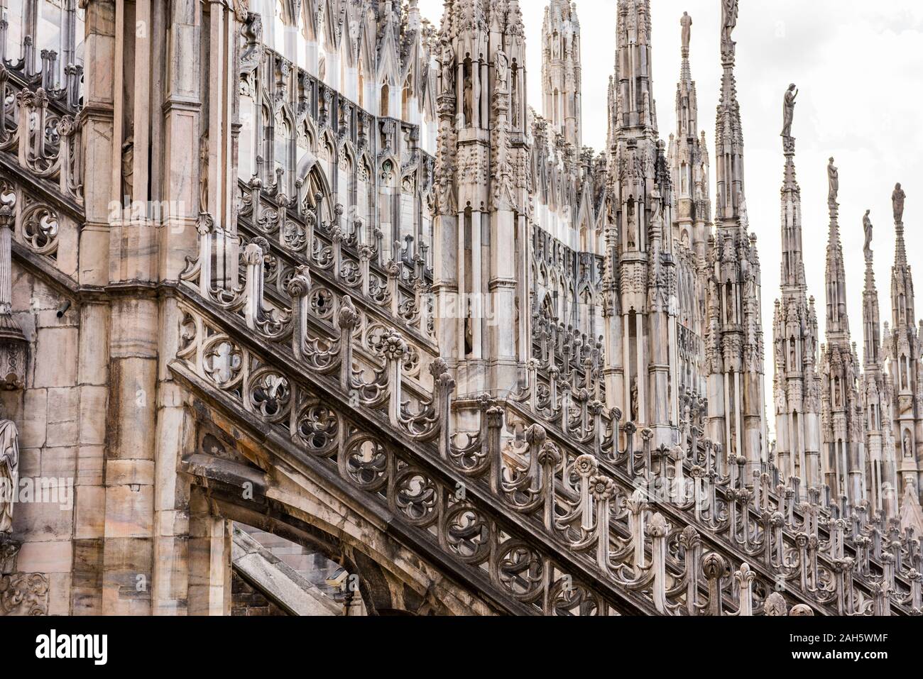 Beautiful architectural details with statues on the top of building of ...
