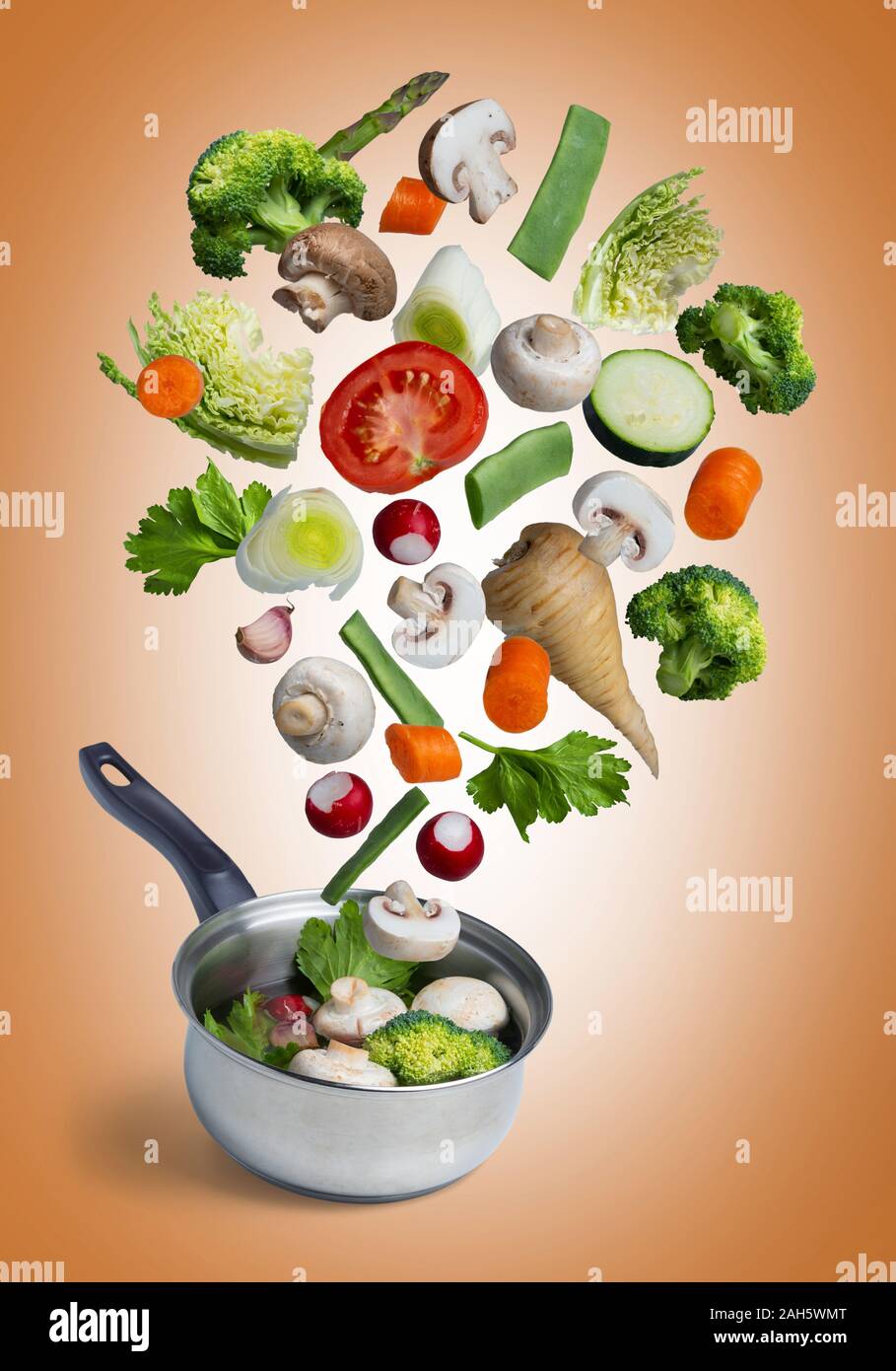 Flying fresh vegetable ingredients hi-res stock photography and images ...