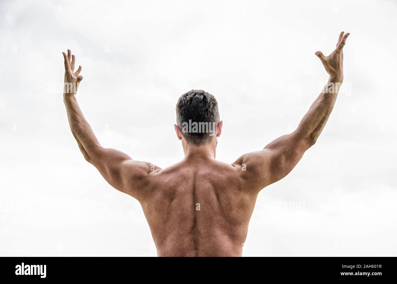 Man celebrating success. Bodybuilder strong muscular body feeling ...