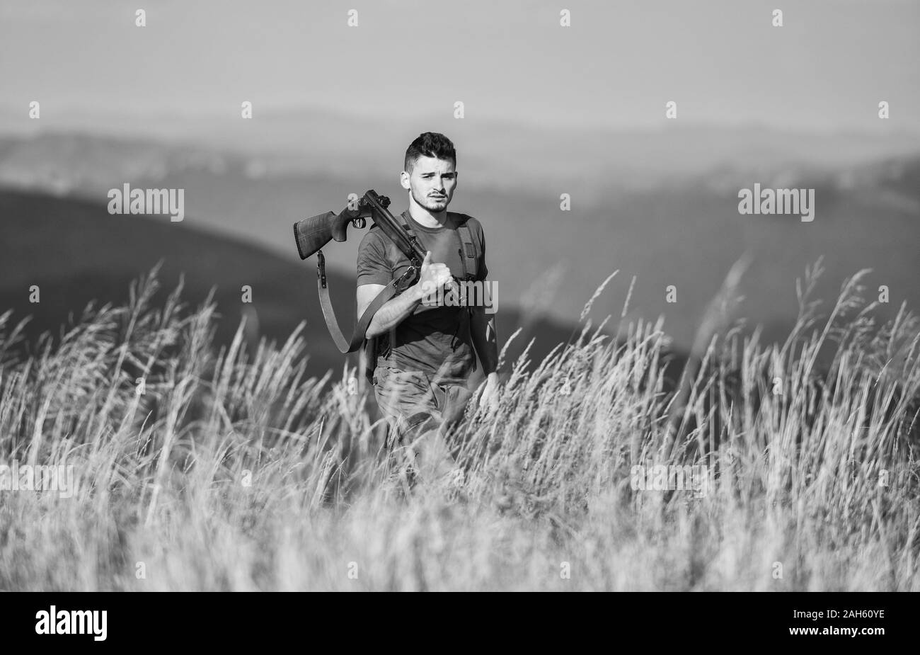 man ready to fire. hunter hobby. soldier in the field. polygon ...