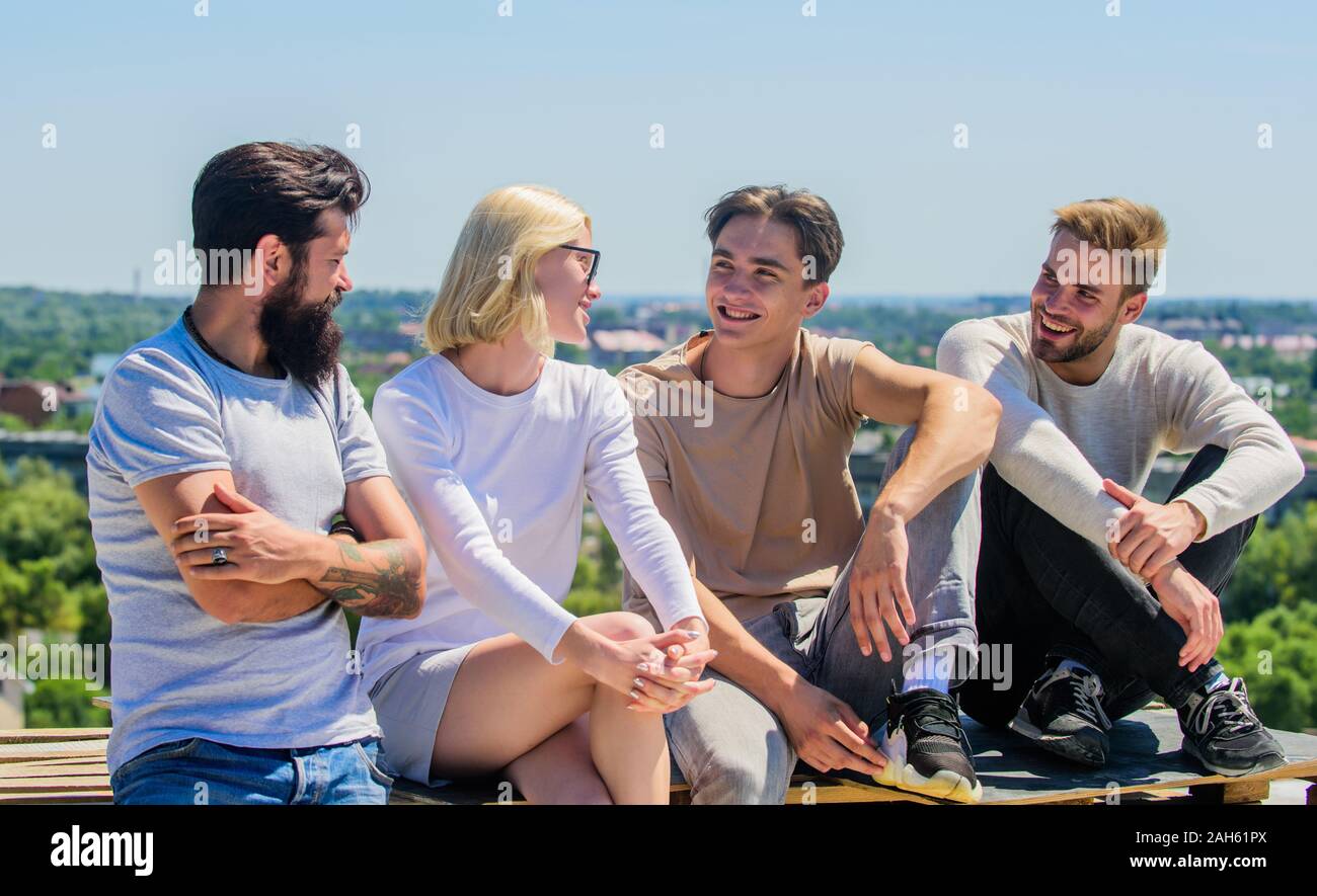 Family traditions. diverse young people talking together. happy men and ...