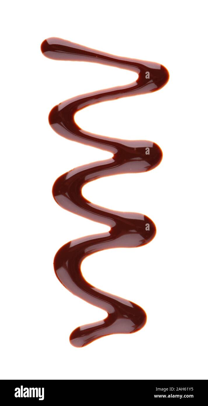 Chocolate syrup drizzle isolated on white background. Splashes of sweet ...