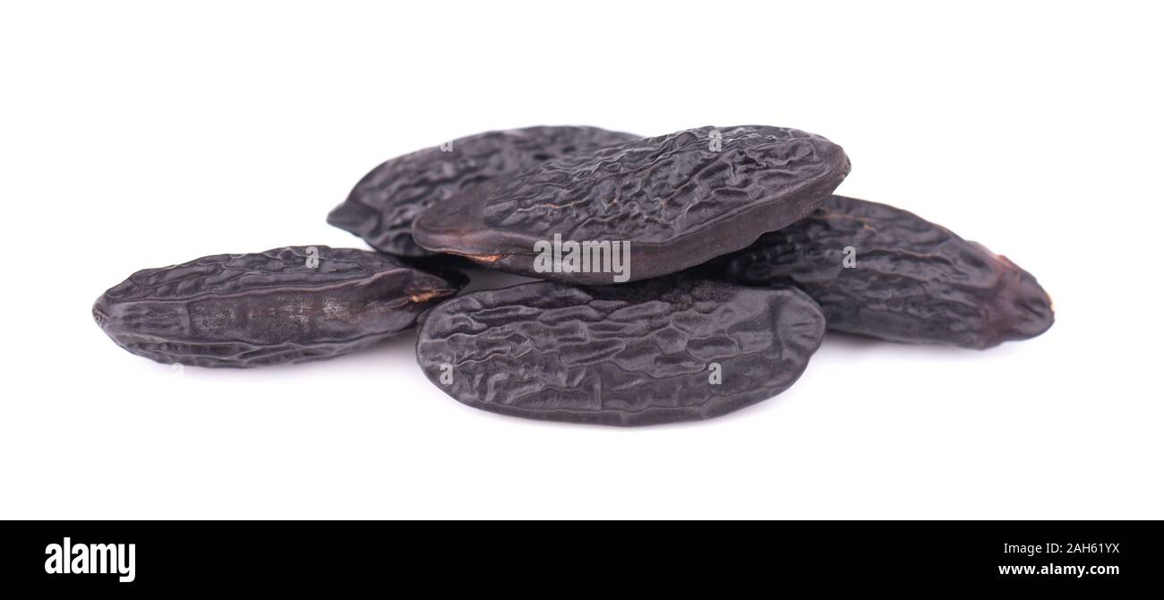 Tonka beans isolated on white background. Bean of Dipteryx odorata ...