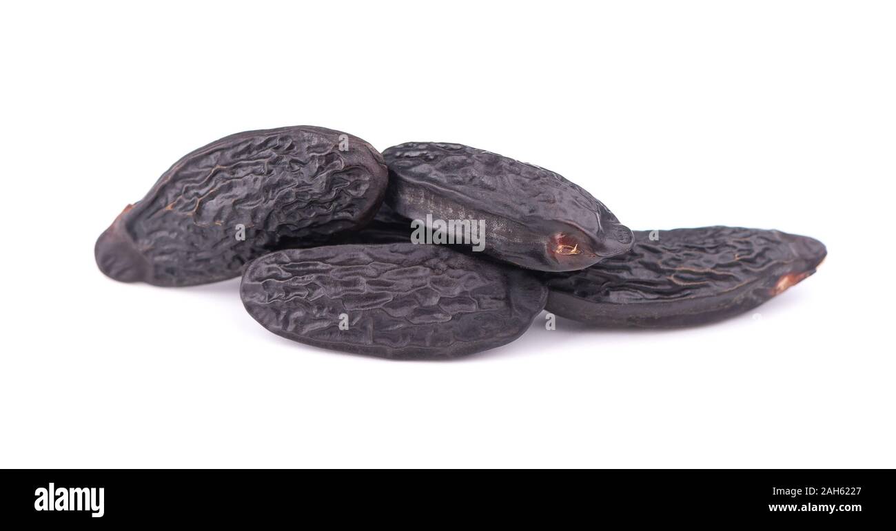 Tonka beans isolated on white background. Bean of Dipteryx odorata ...